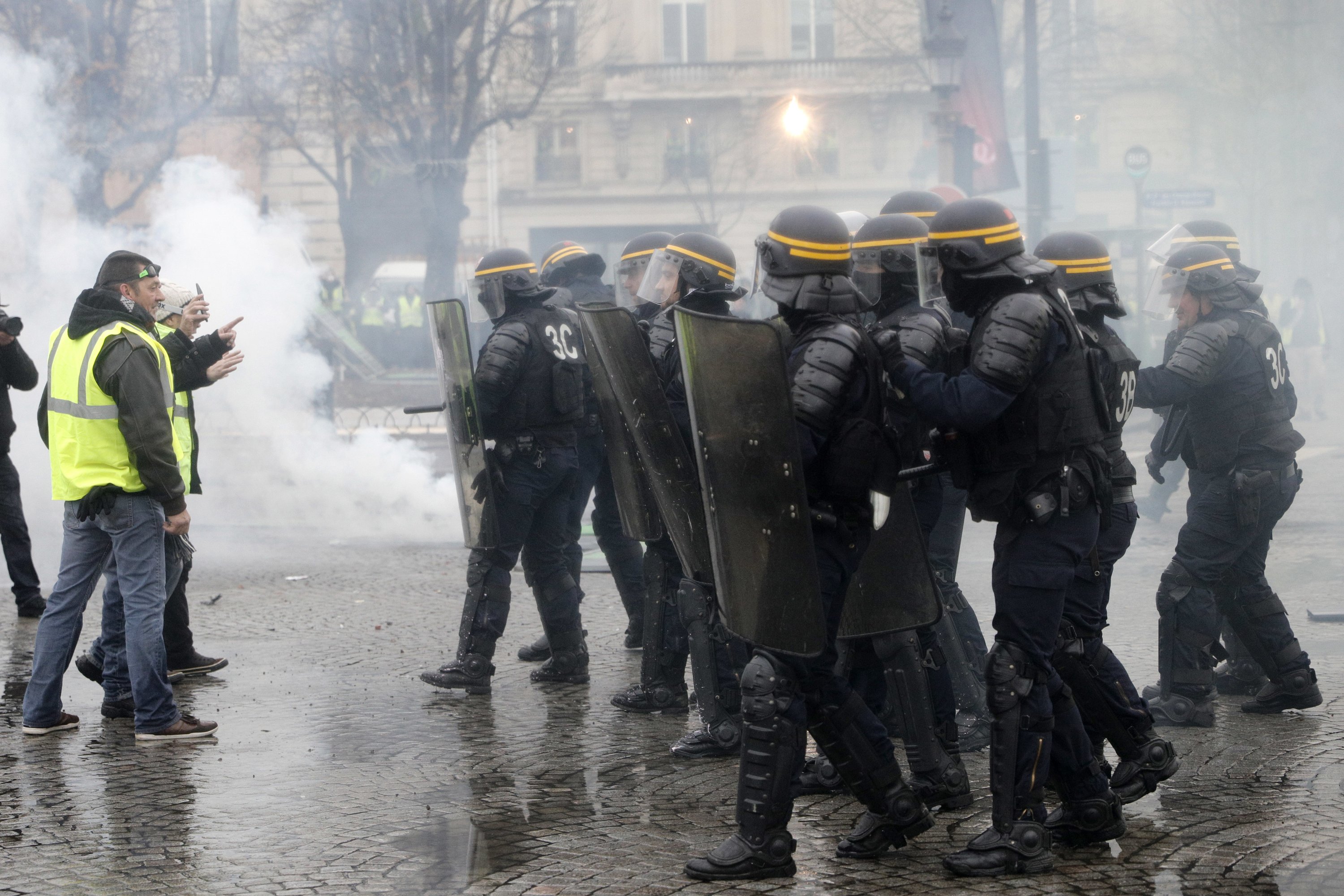 French protesters angry over fuel taxes clash with police