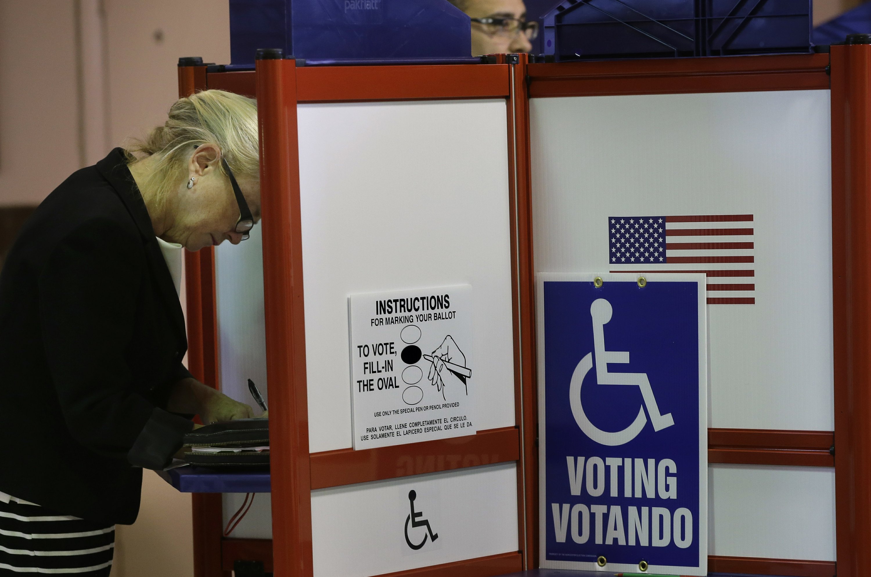 Massachusetts voters seize 1st chance to cast ballots early | AP News