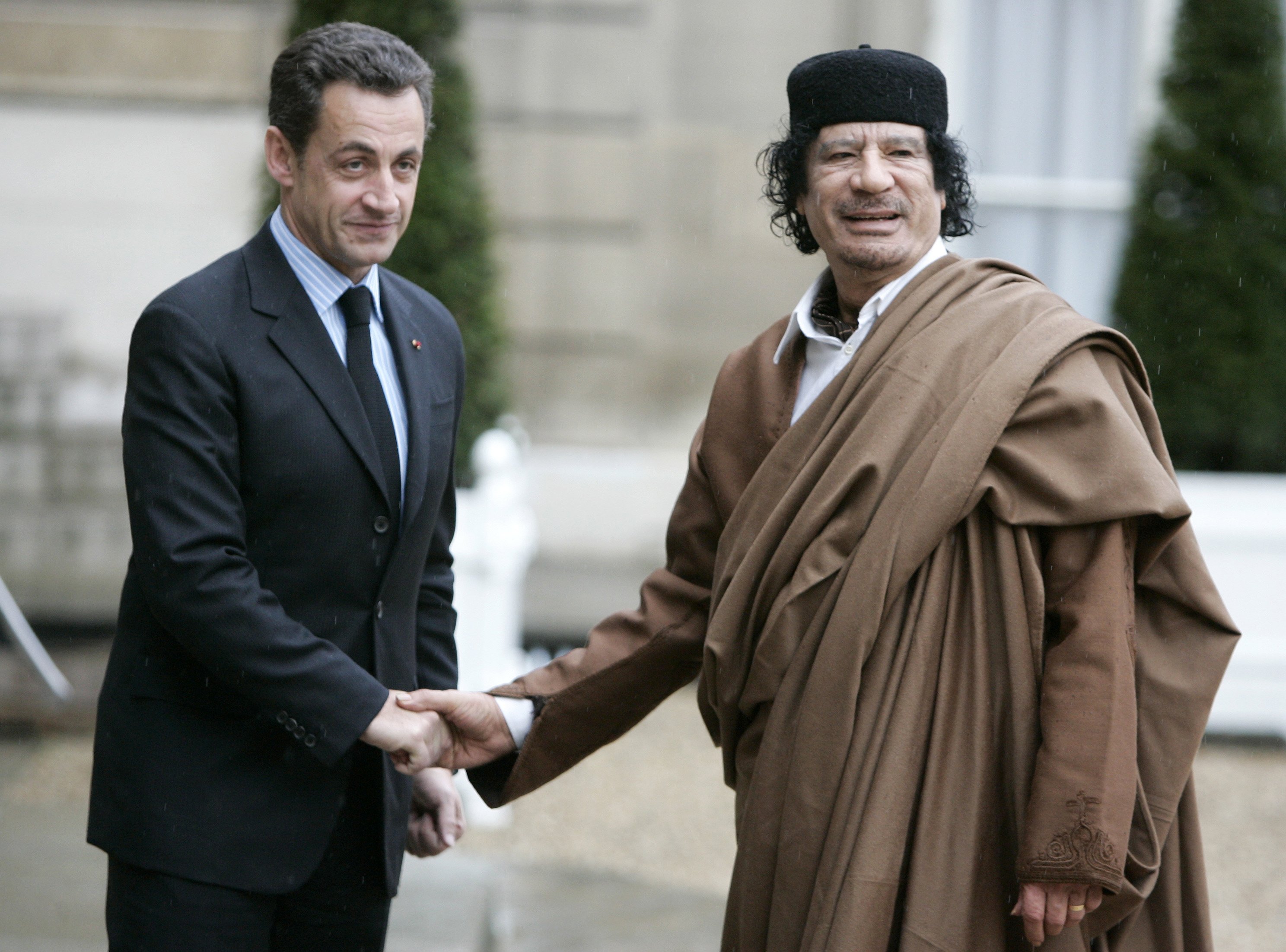 Ex-French president Sarkozy held on Gadhafi financing claims | AP News