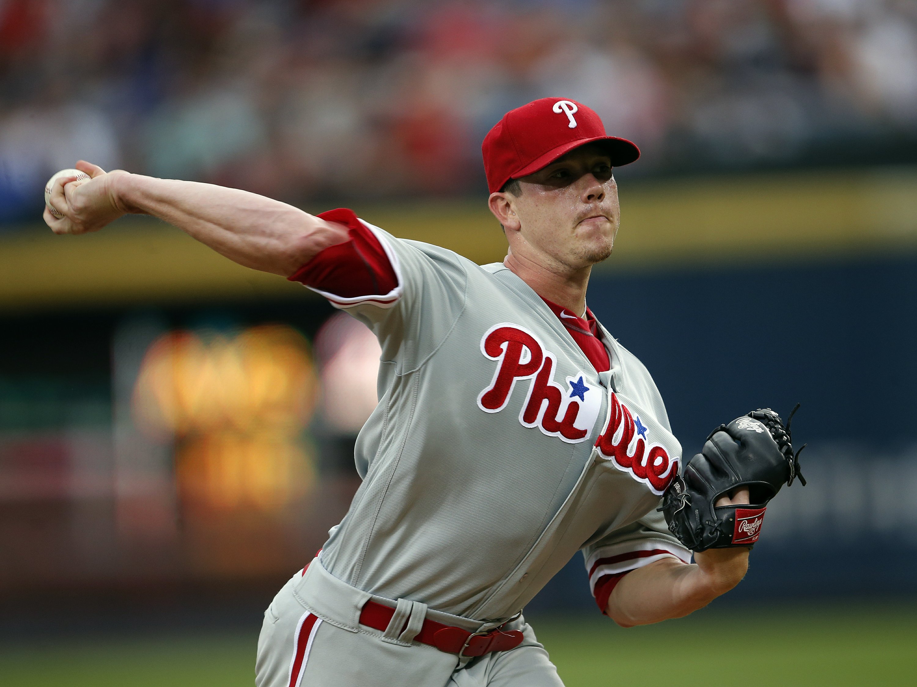Hellickson uses arm, bat to help Phillies beat Braves | AP News