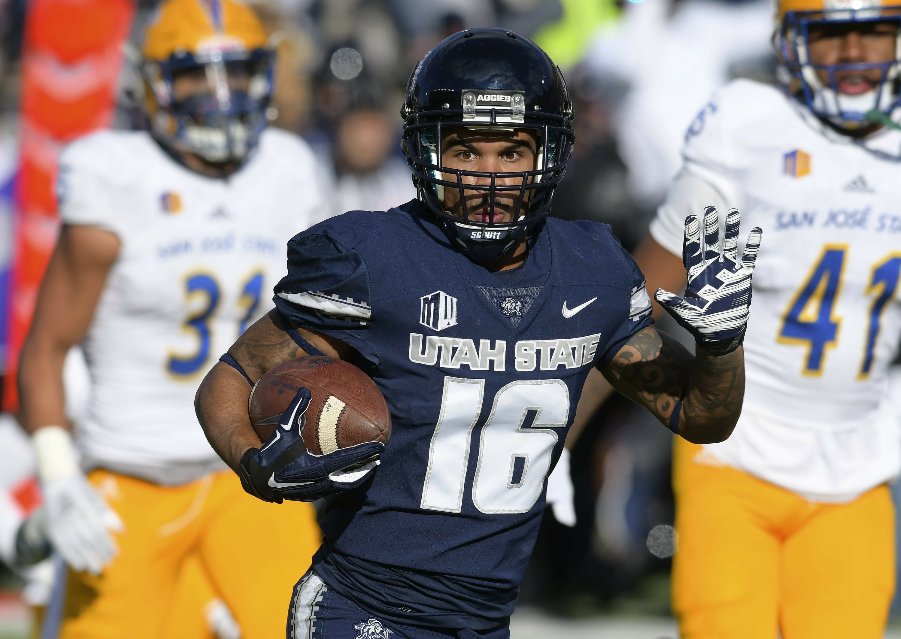 No. 14 Utah State beats SJSU 62-24 for 9th straight win | AP News