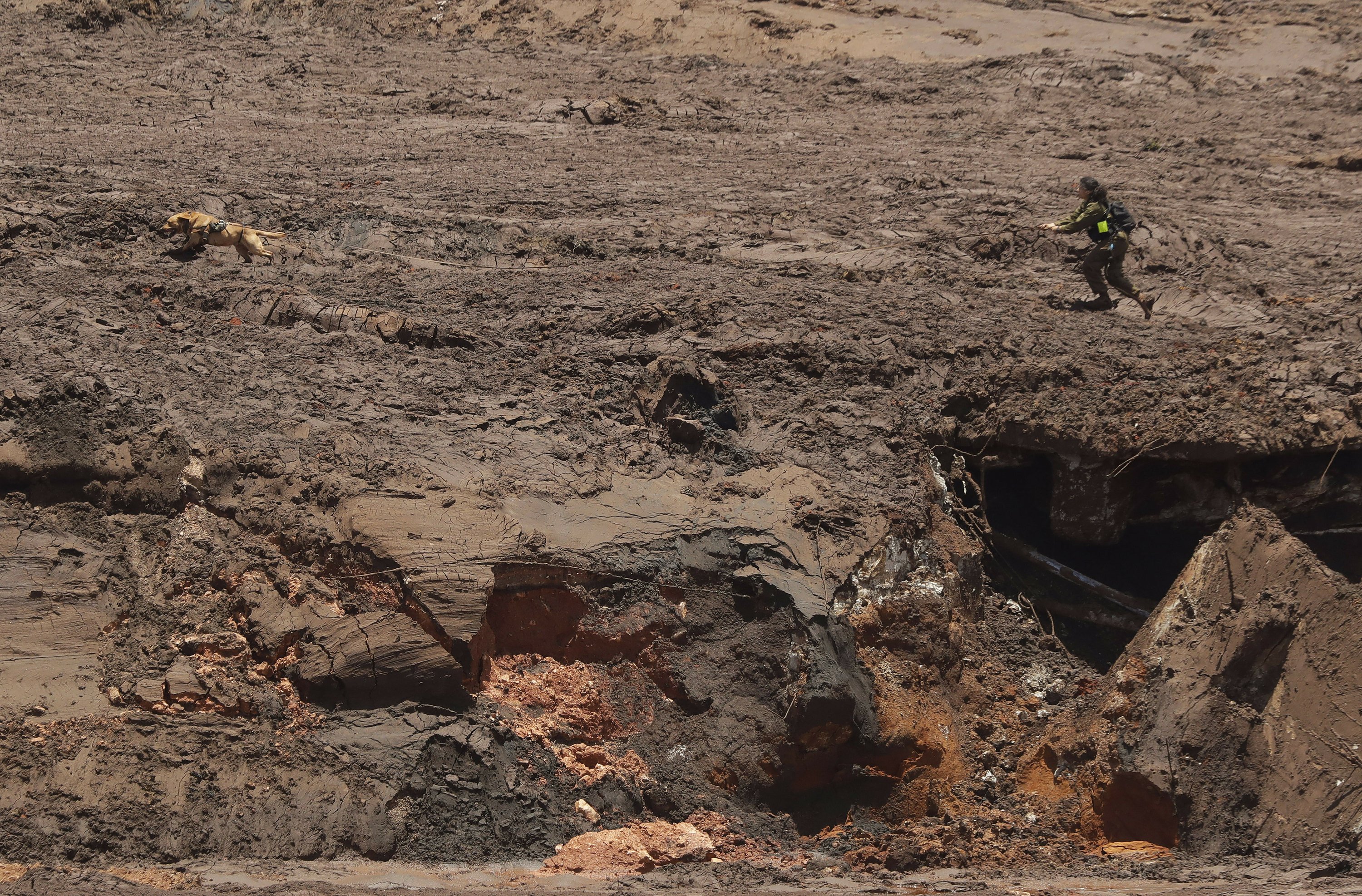 Families dig to find loved ones in Brazil dam collapse | AP News