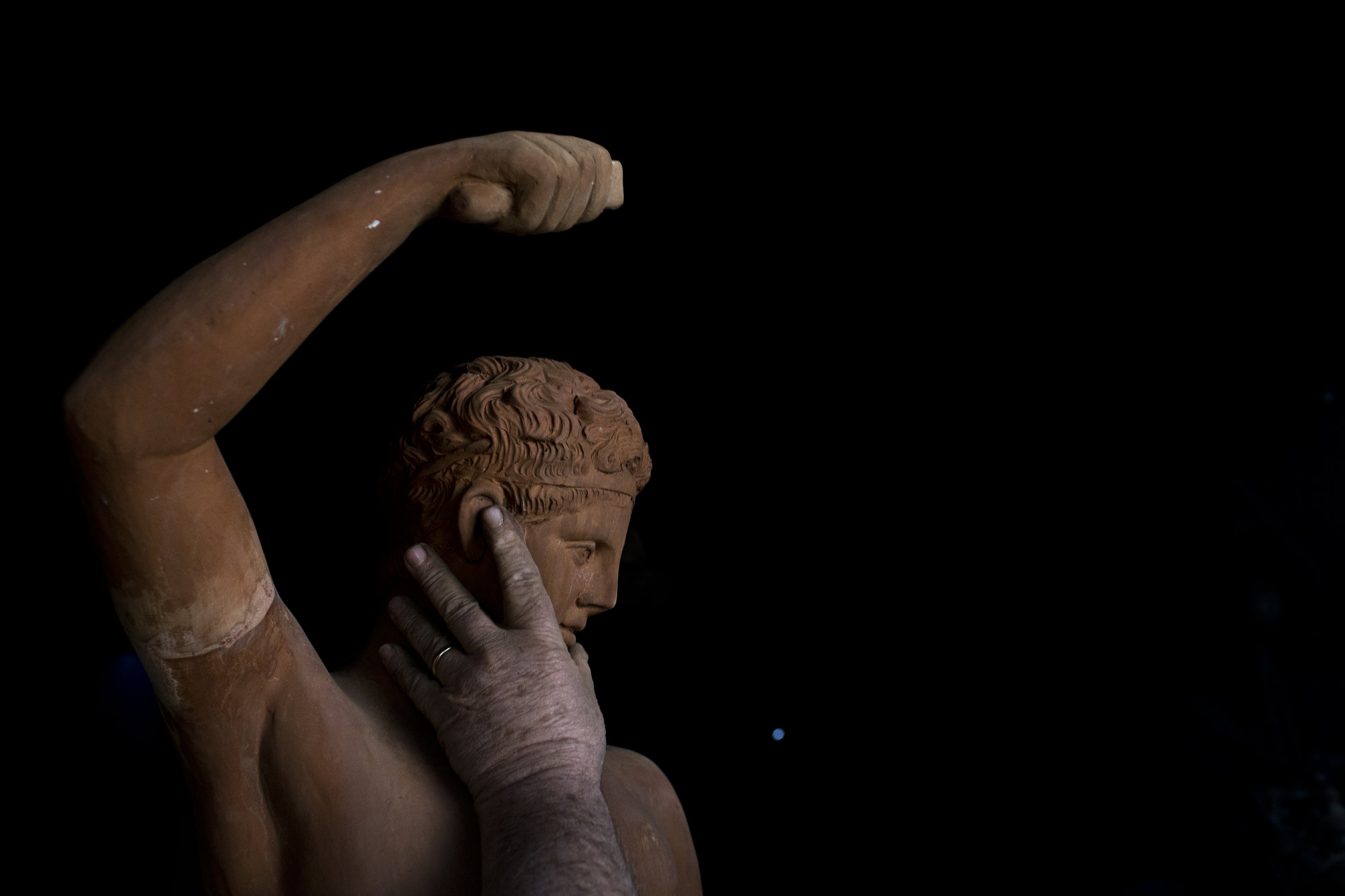 Greek terracotta workshop produces an army of gods | AP News