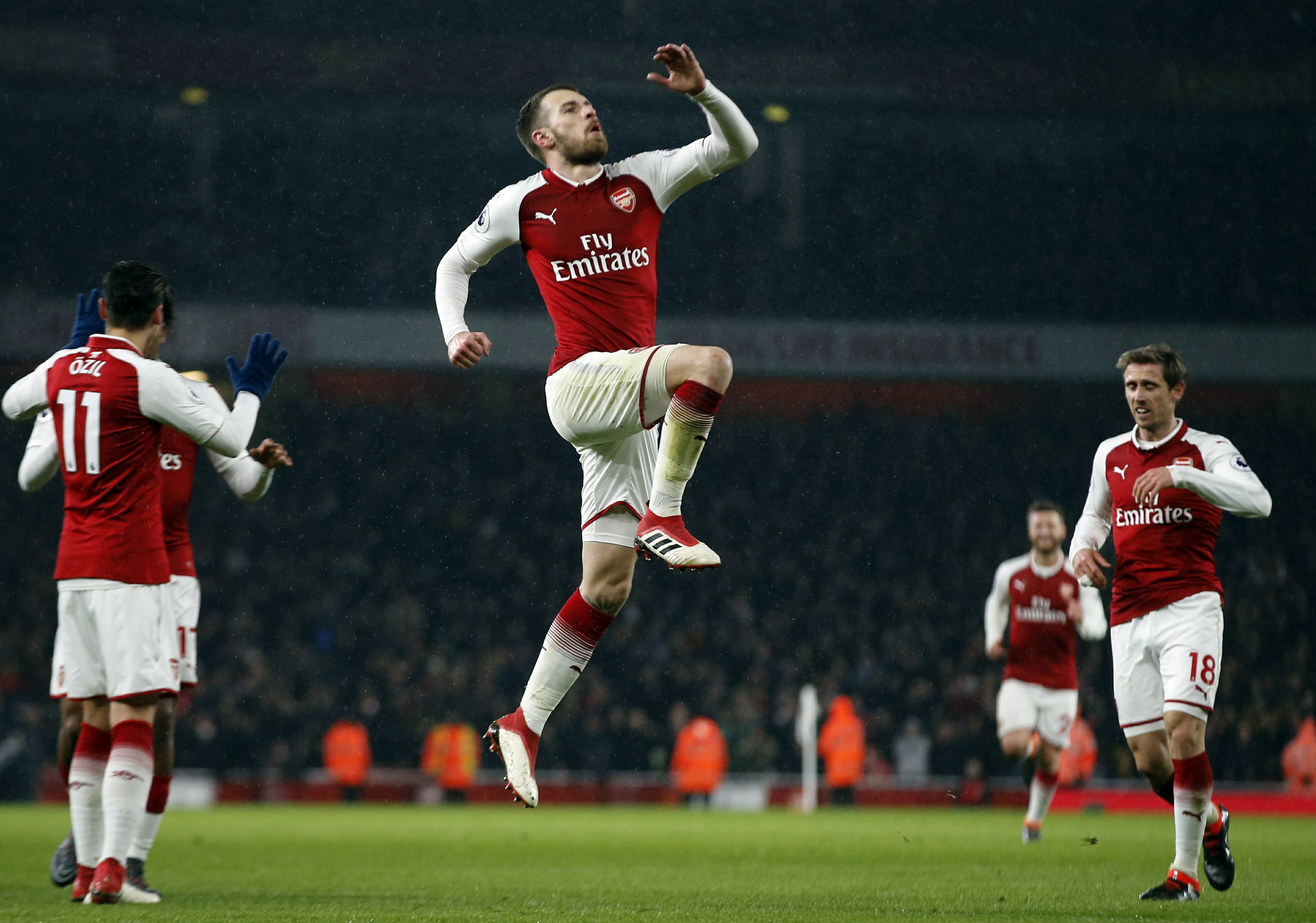 Ramsey treble, 3 Mkhitaryan assists as Arsenal routs Everton | AP News