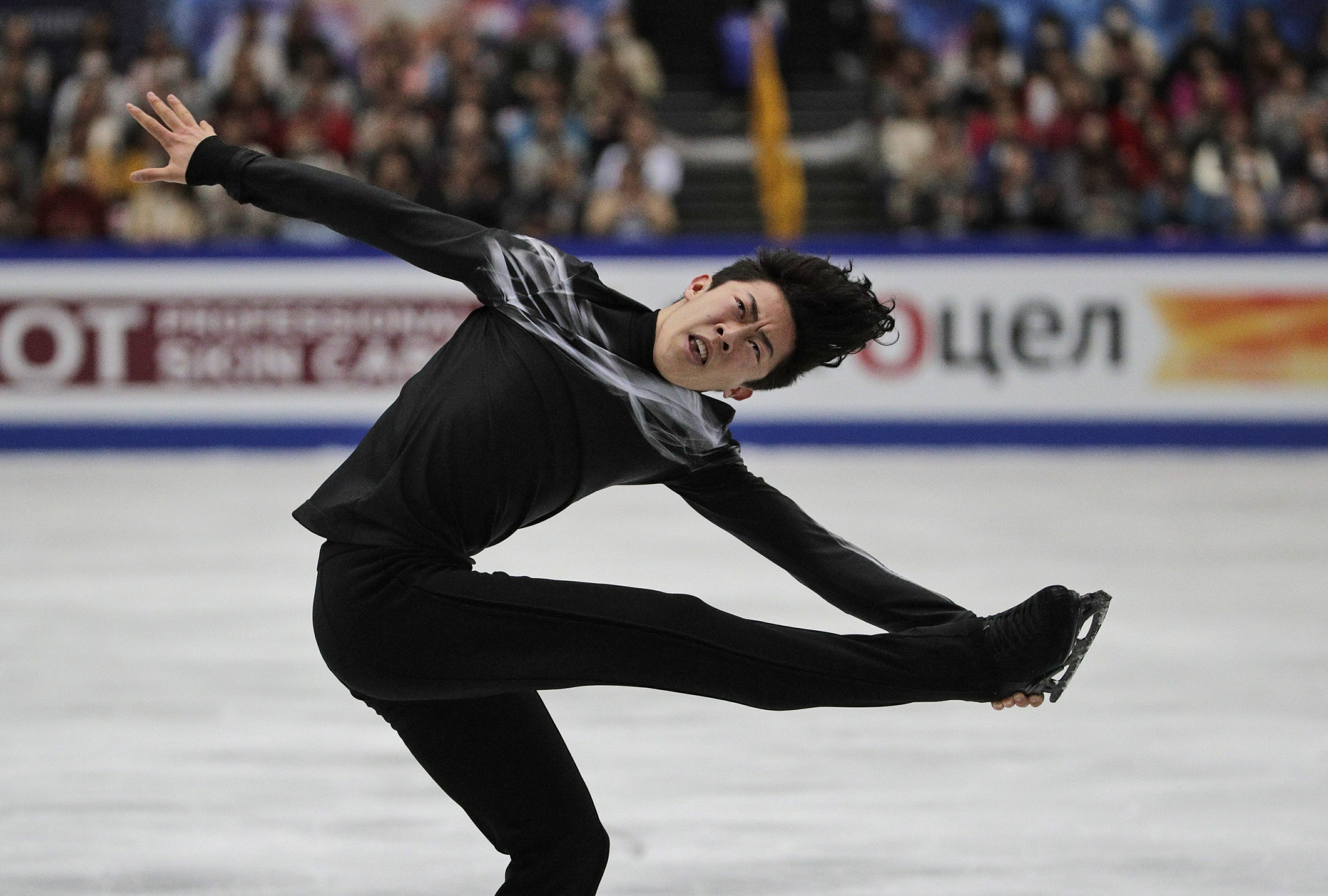 Chen produces spectacular free skate to win gold at worlds | AP News