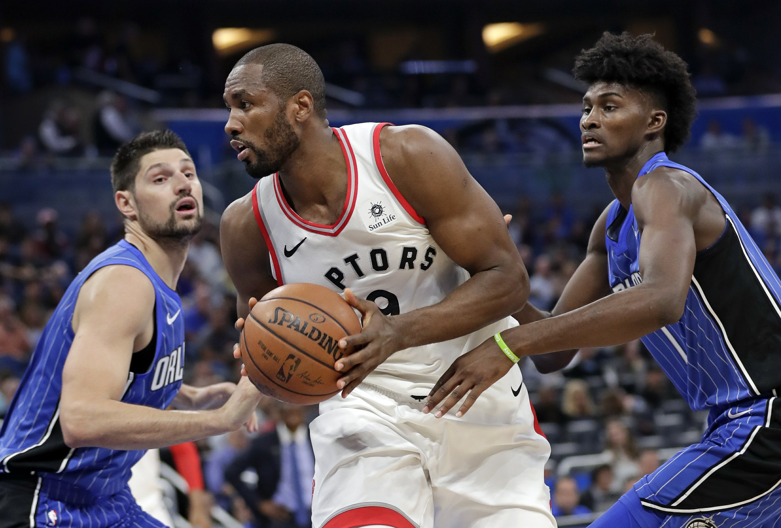 Raptors use strong defense in 4th to beat Magic 93-86 | AP News