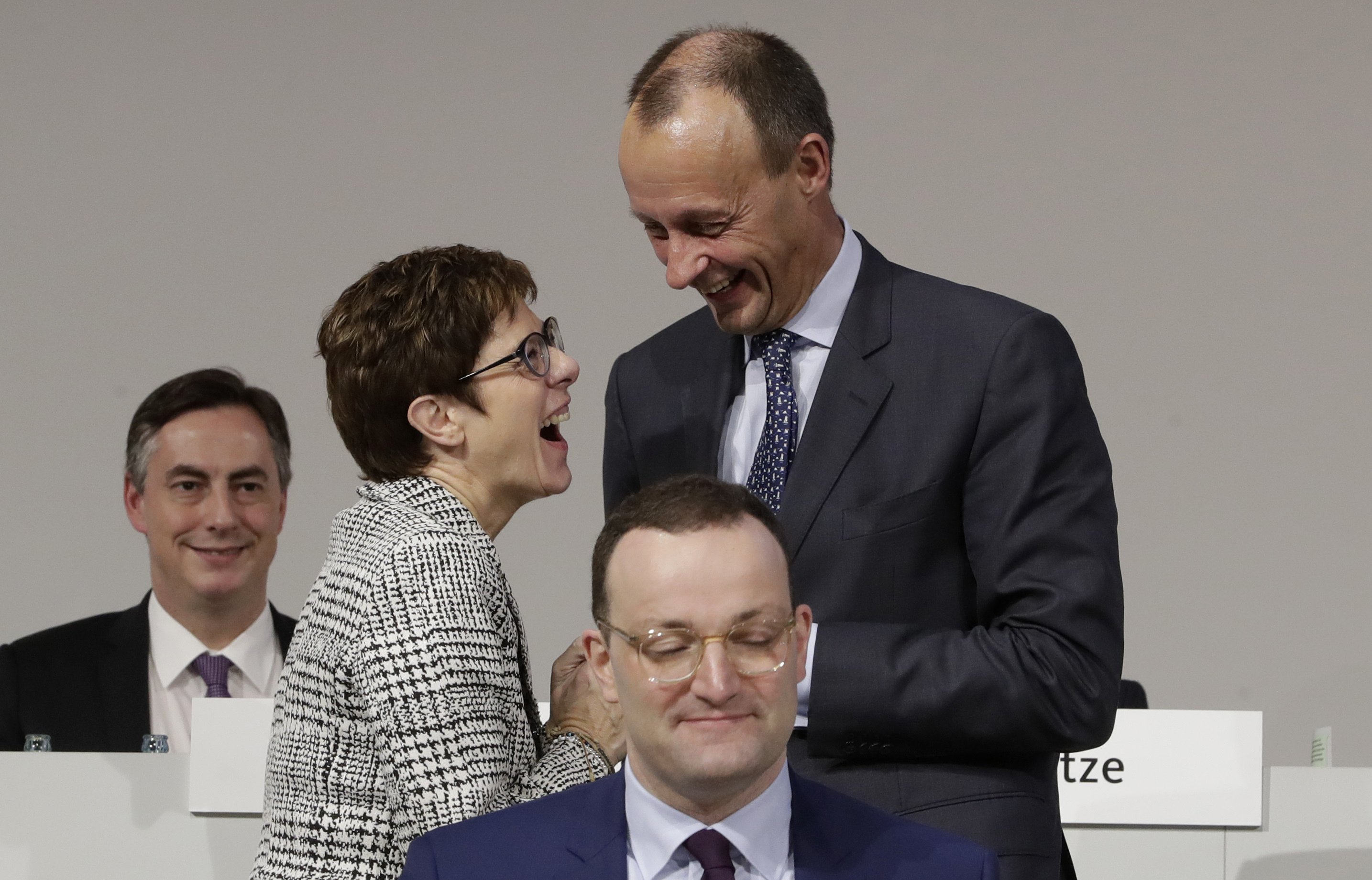 Merkel ally becomes German conservative party's leader | AP News