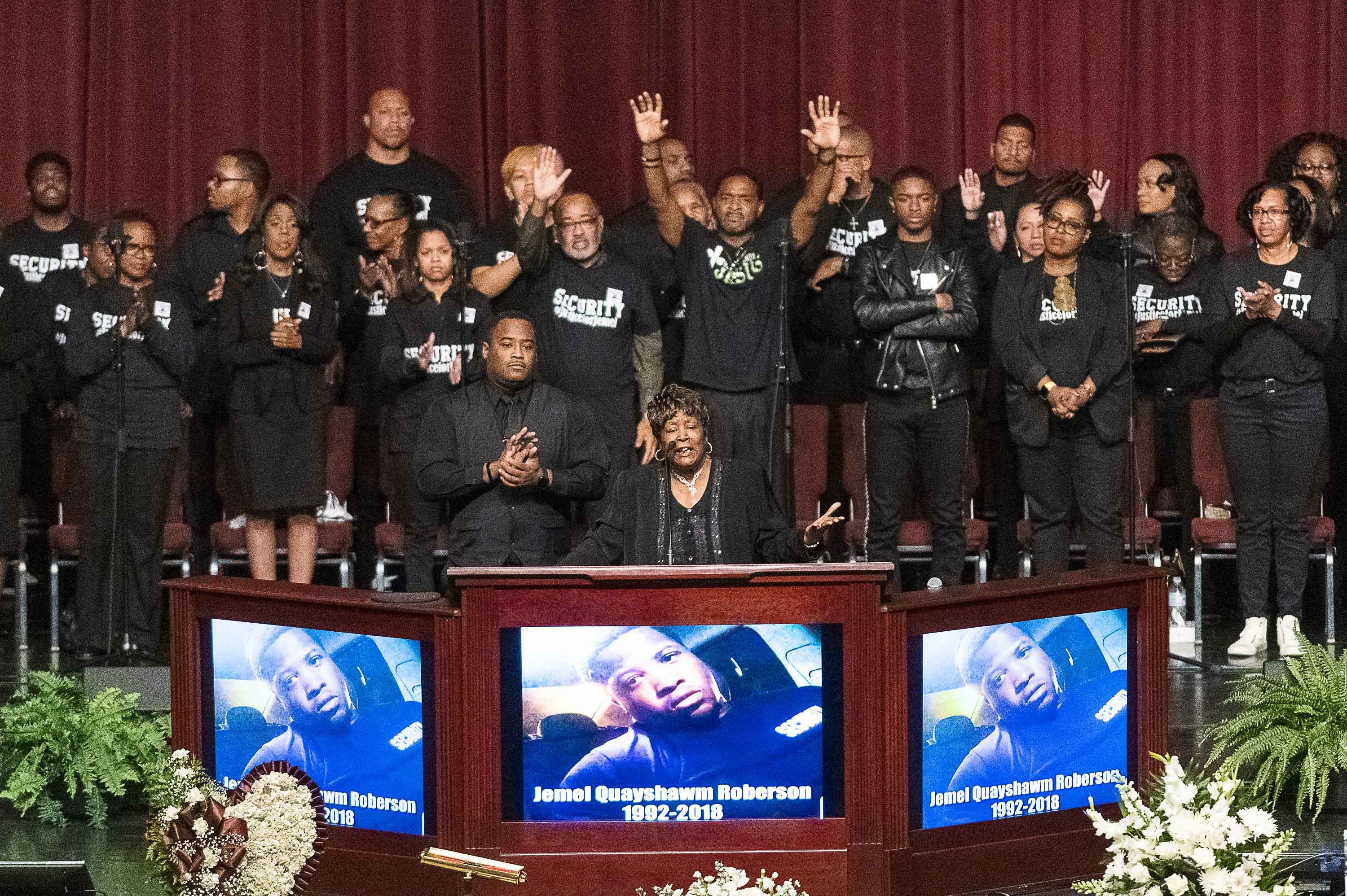 Mourners attend funeral for security guard shot by officer | AP News