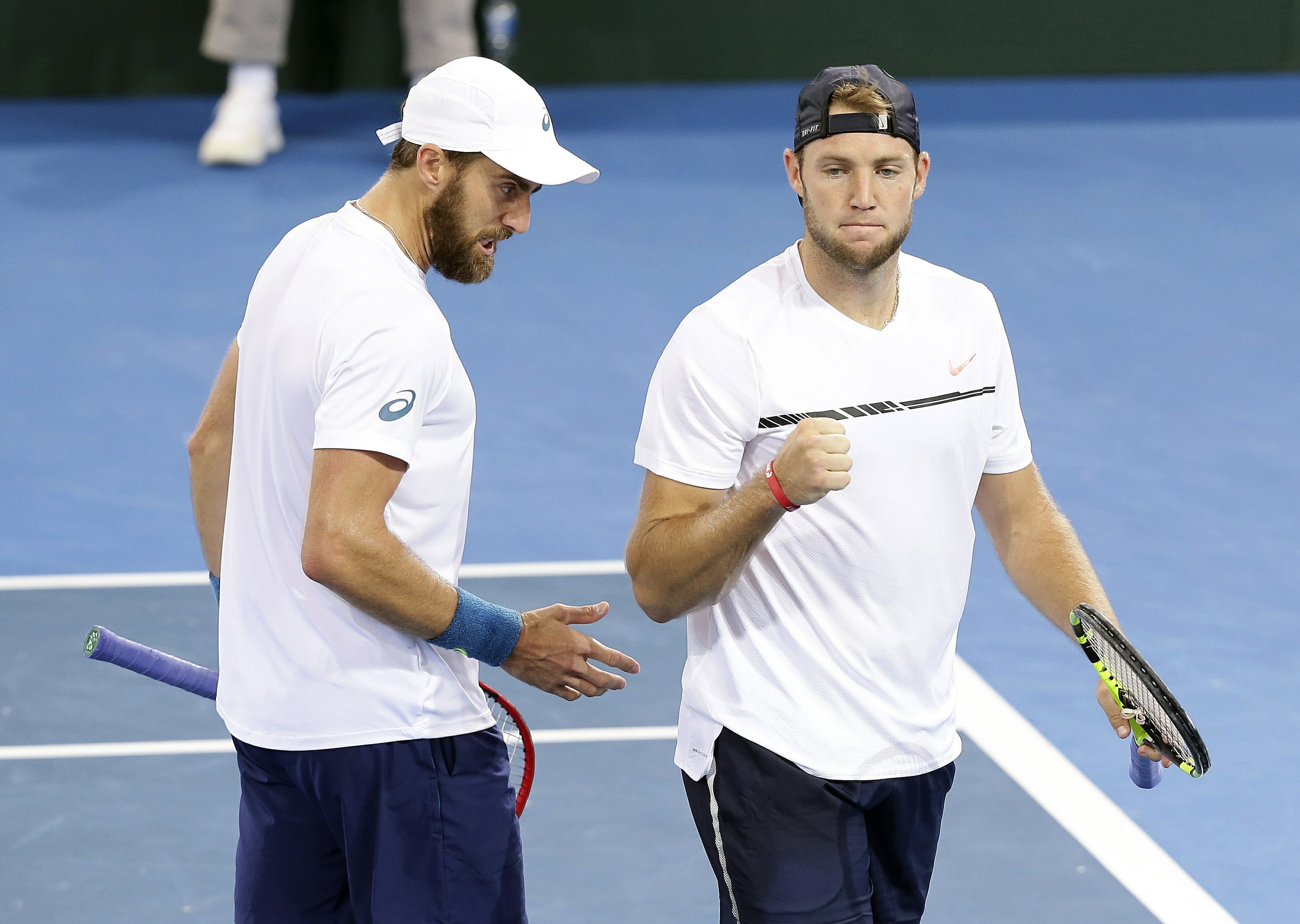Davis Cup: US wins doubles to stay alive in quarterfinal | AP News