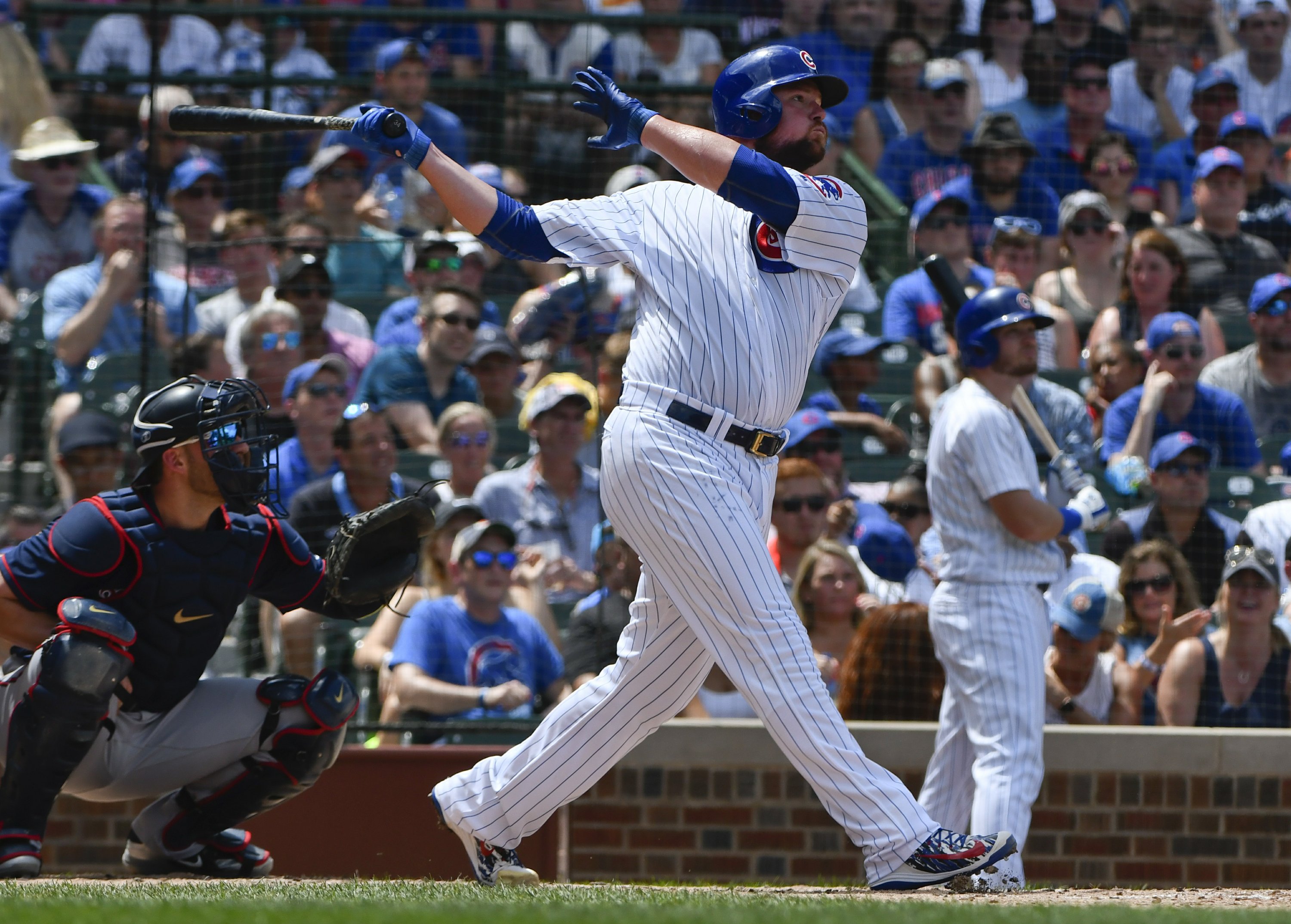 Lester homers, gets NL-high 11th win as Cubs top Twins 11-10 | AP News