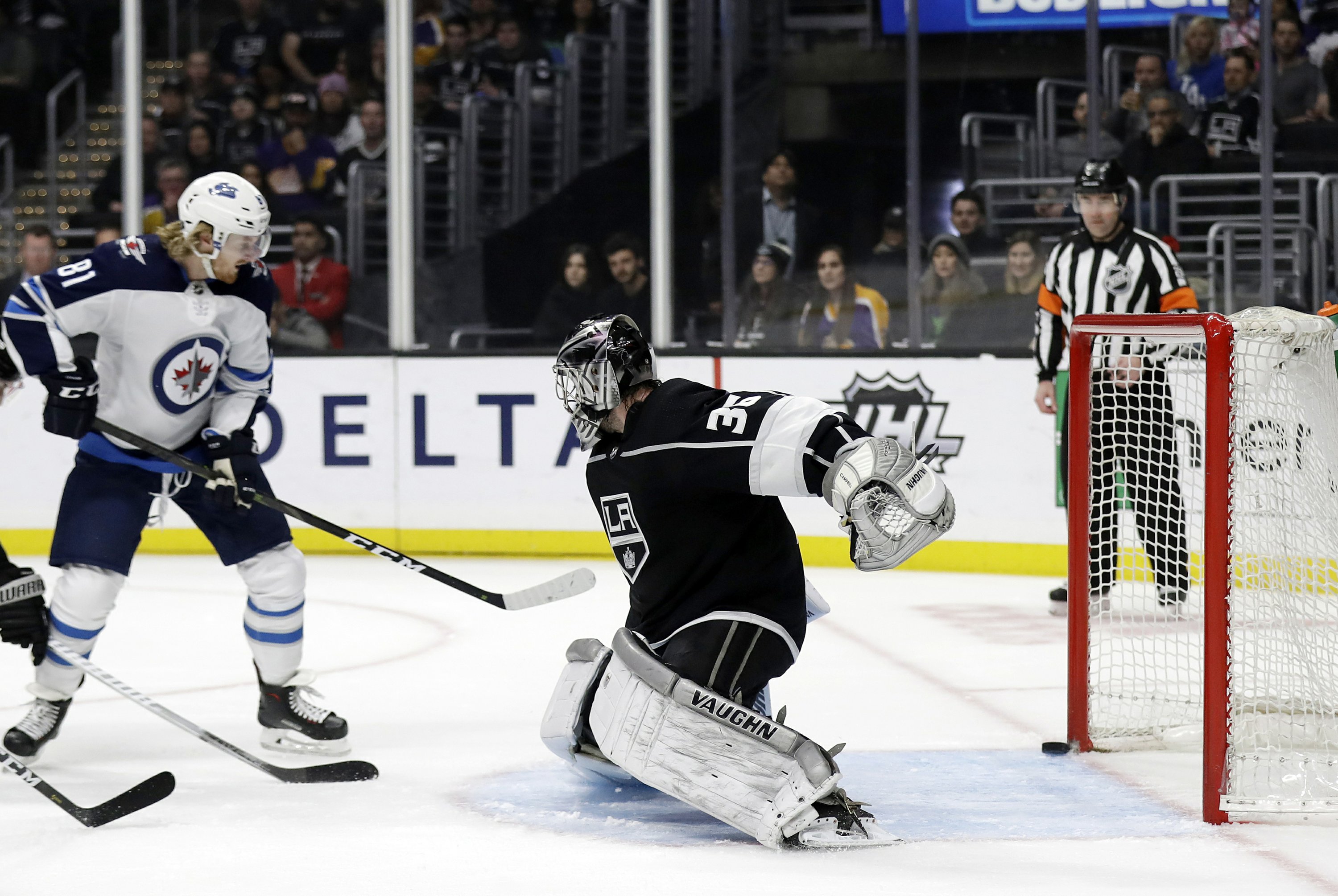 Jets extend lead in Central with 3-2 win over Kings | AP News