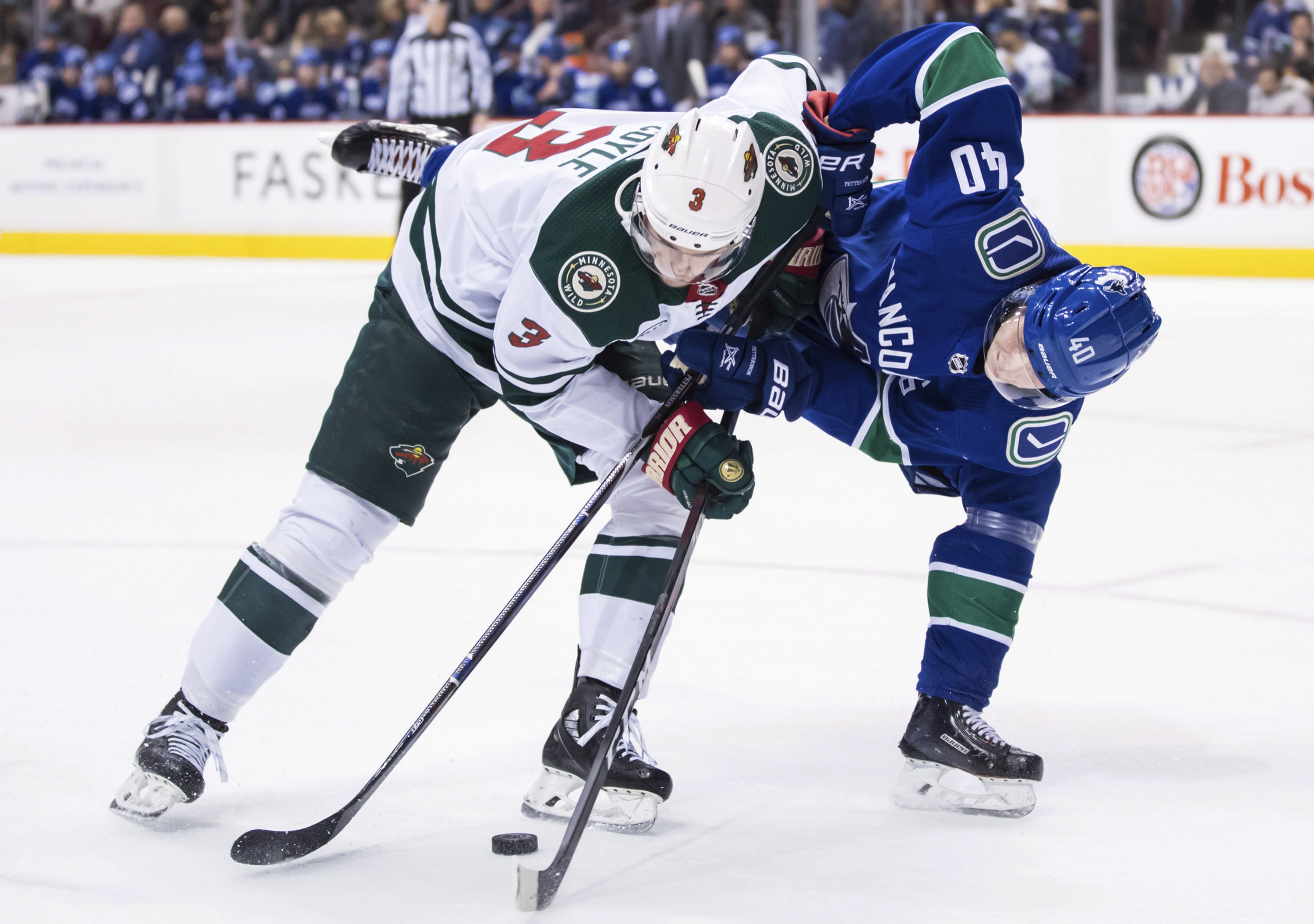 Wild score 3 power-play goals in 3-2 win over Canucks | AP News