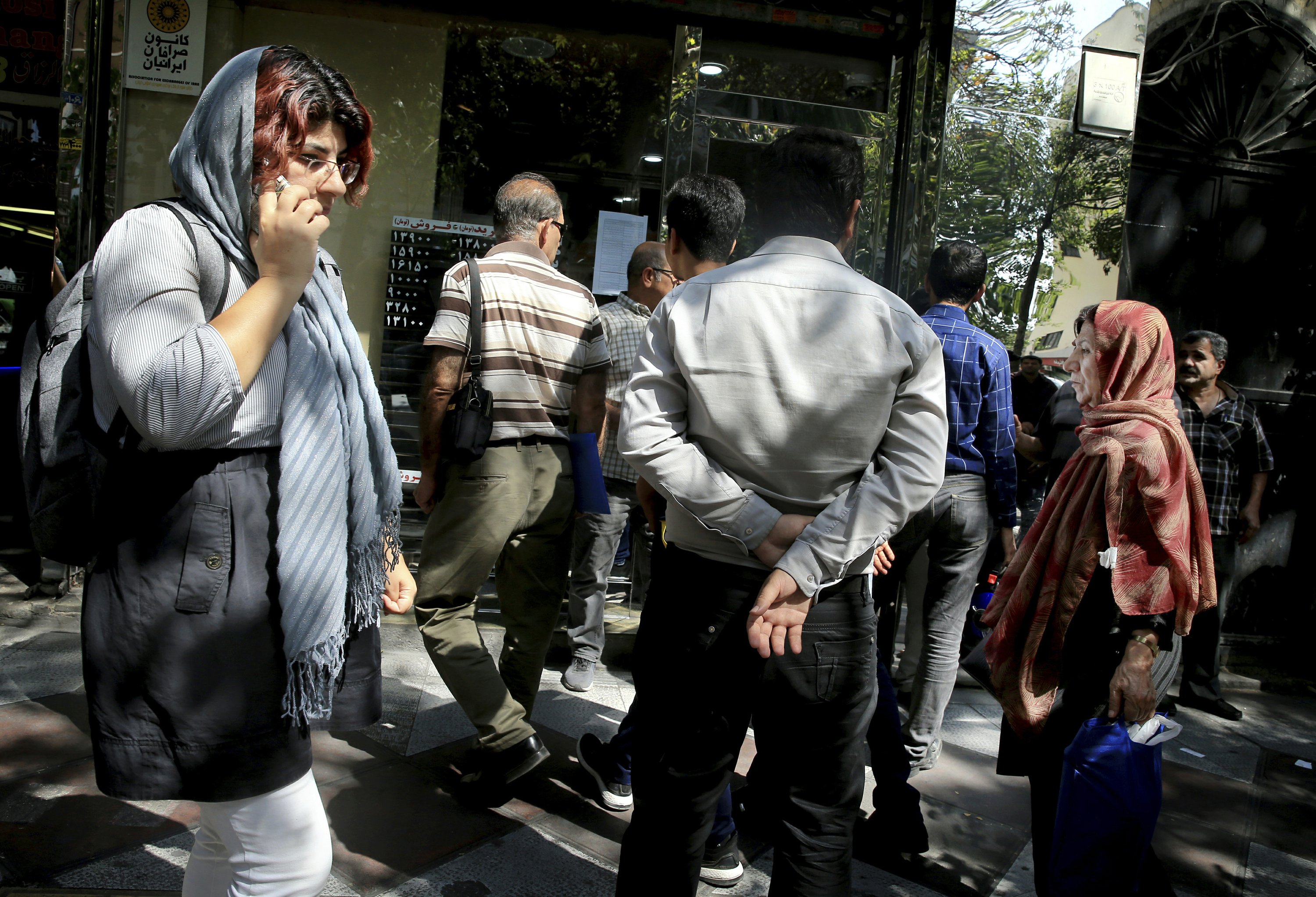 Fears rise, diapers vanish: Iran currency crash causes chaos | AP News
