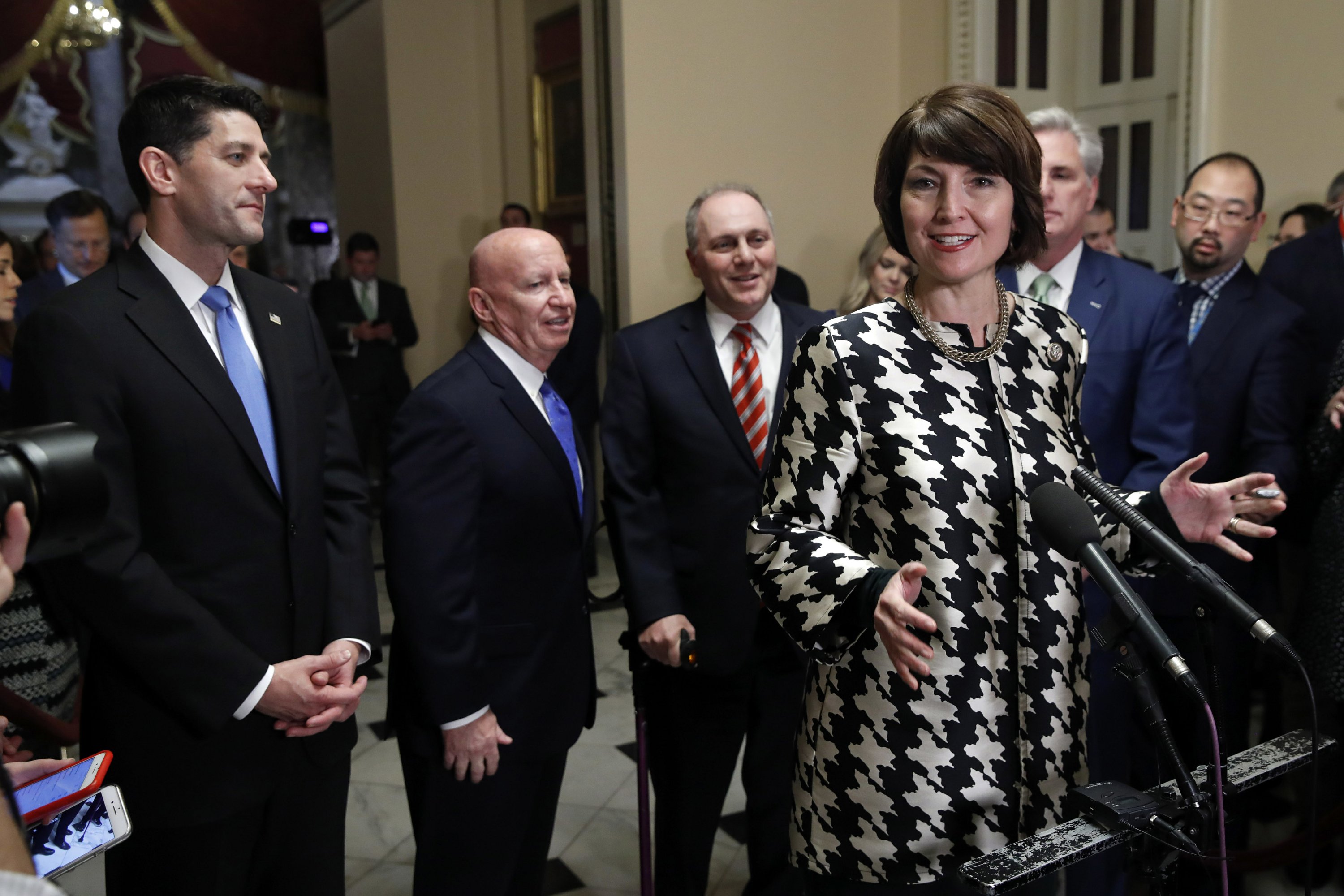 Analysis: GOP's tea party promises dashed in tax cut embrace | AP News