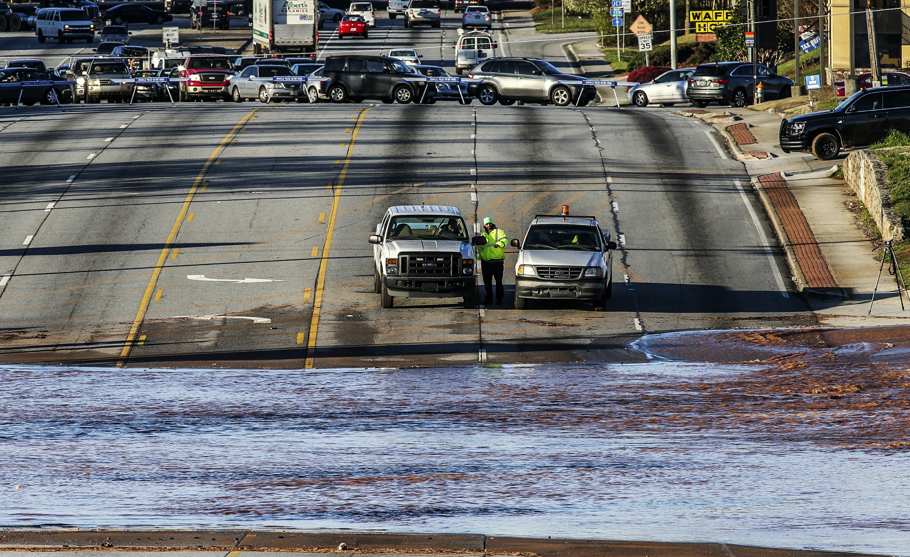 Schools close, road flooded by water main break near Atlanta | AP News