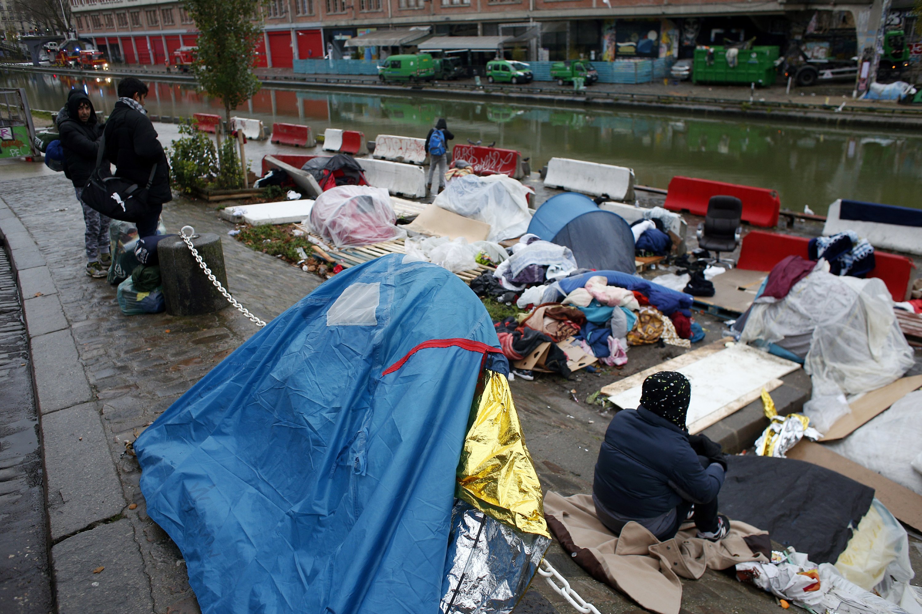 Macron gets tough as France struggles to deal with migrants | AP News
