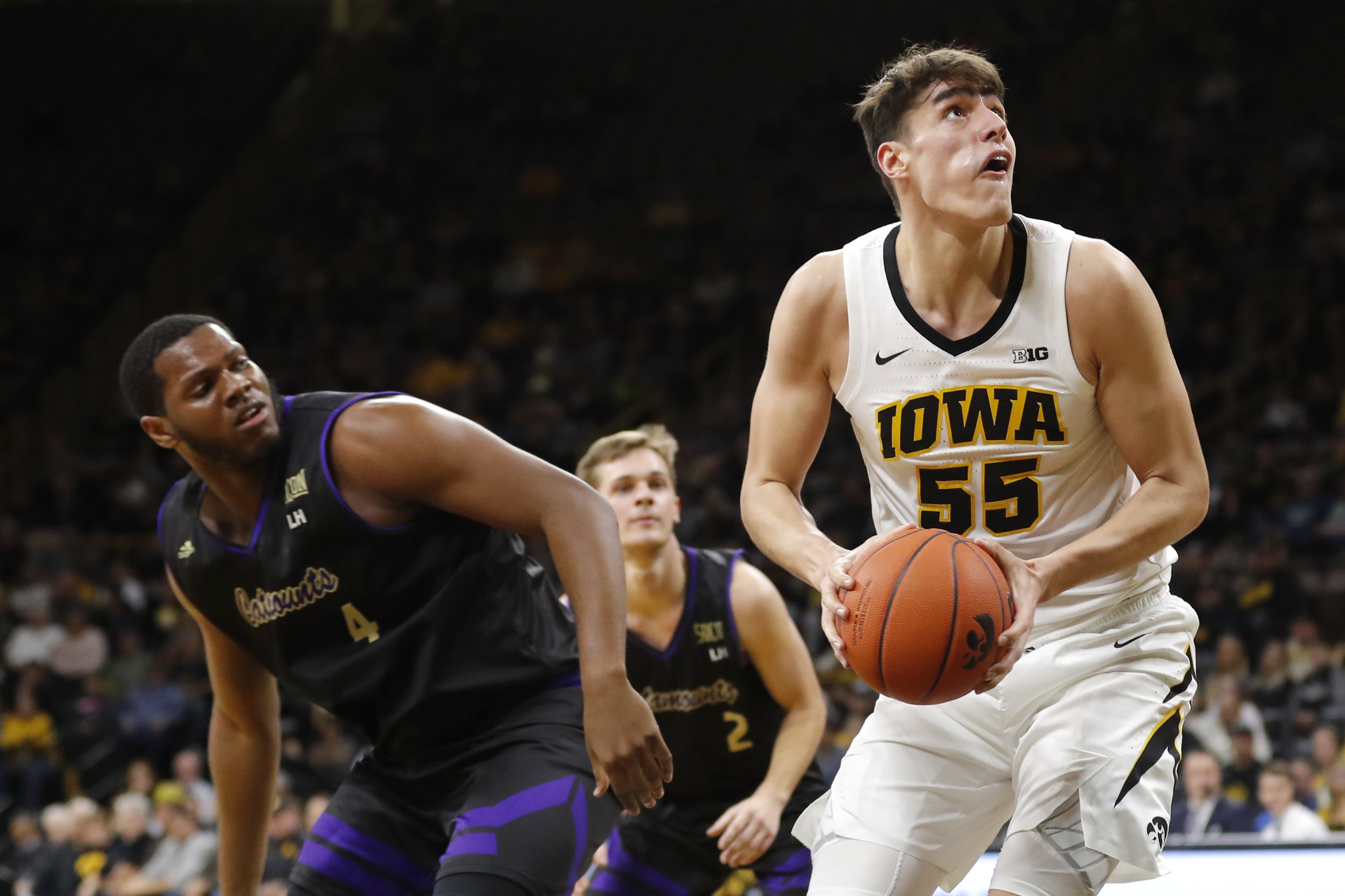 Cook scores 18, No. 23 Iowa beats Western Carolina 78-60 | AP News