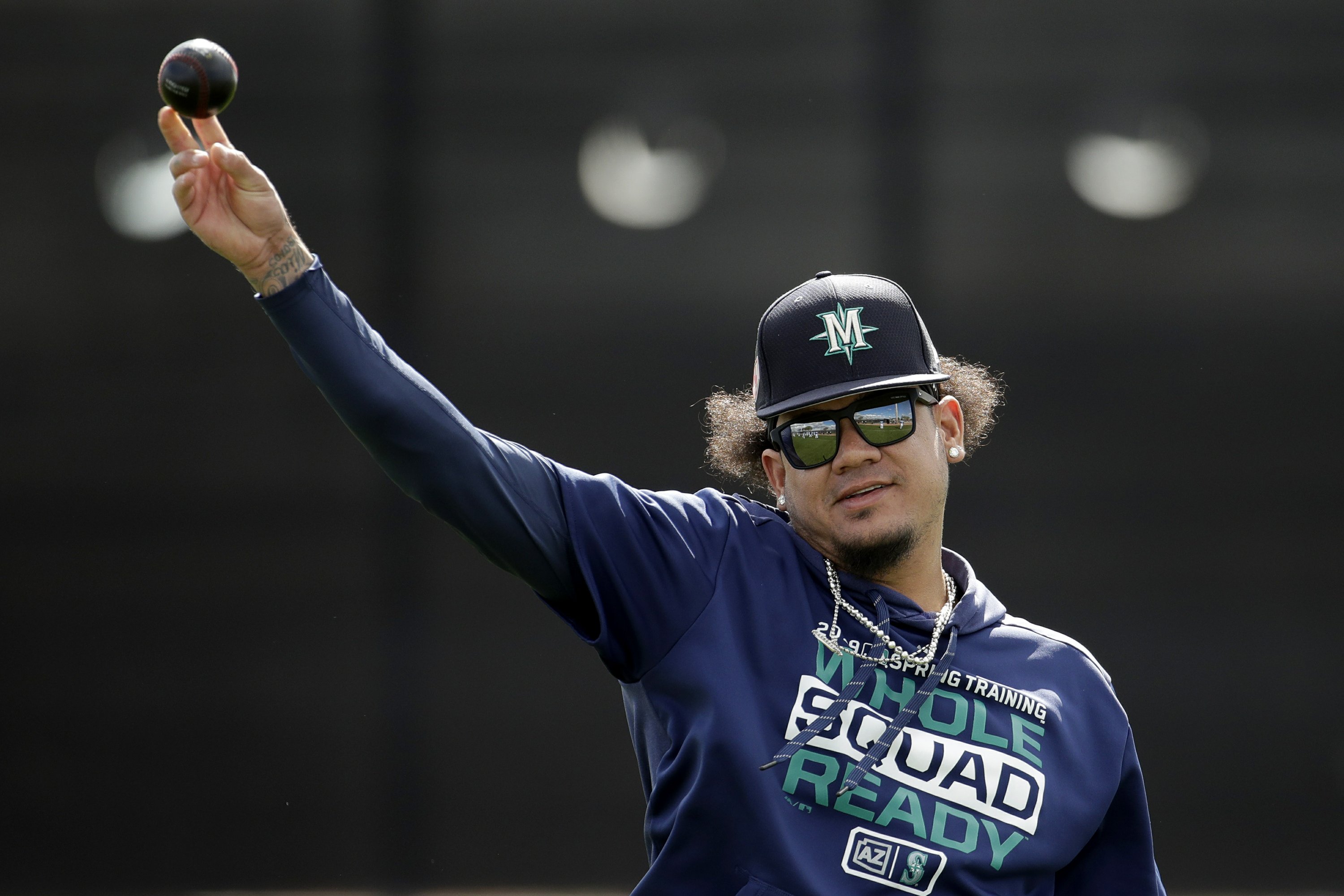 Mariners' Hernandez satisfied despite strange spring start | AP News