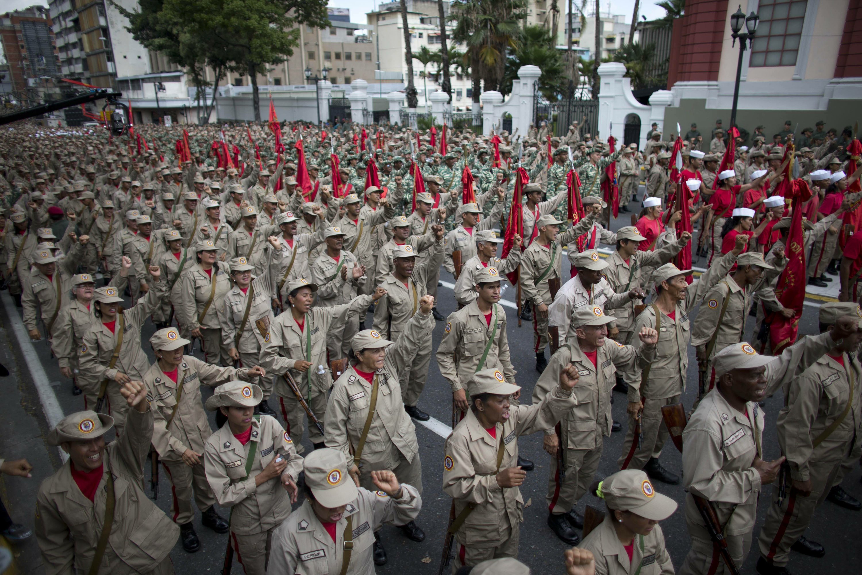 Venezuela's Maduro seeks to expand armed civilian militias | AP News