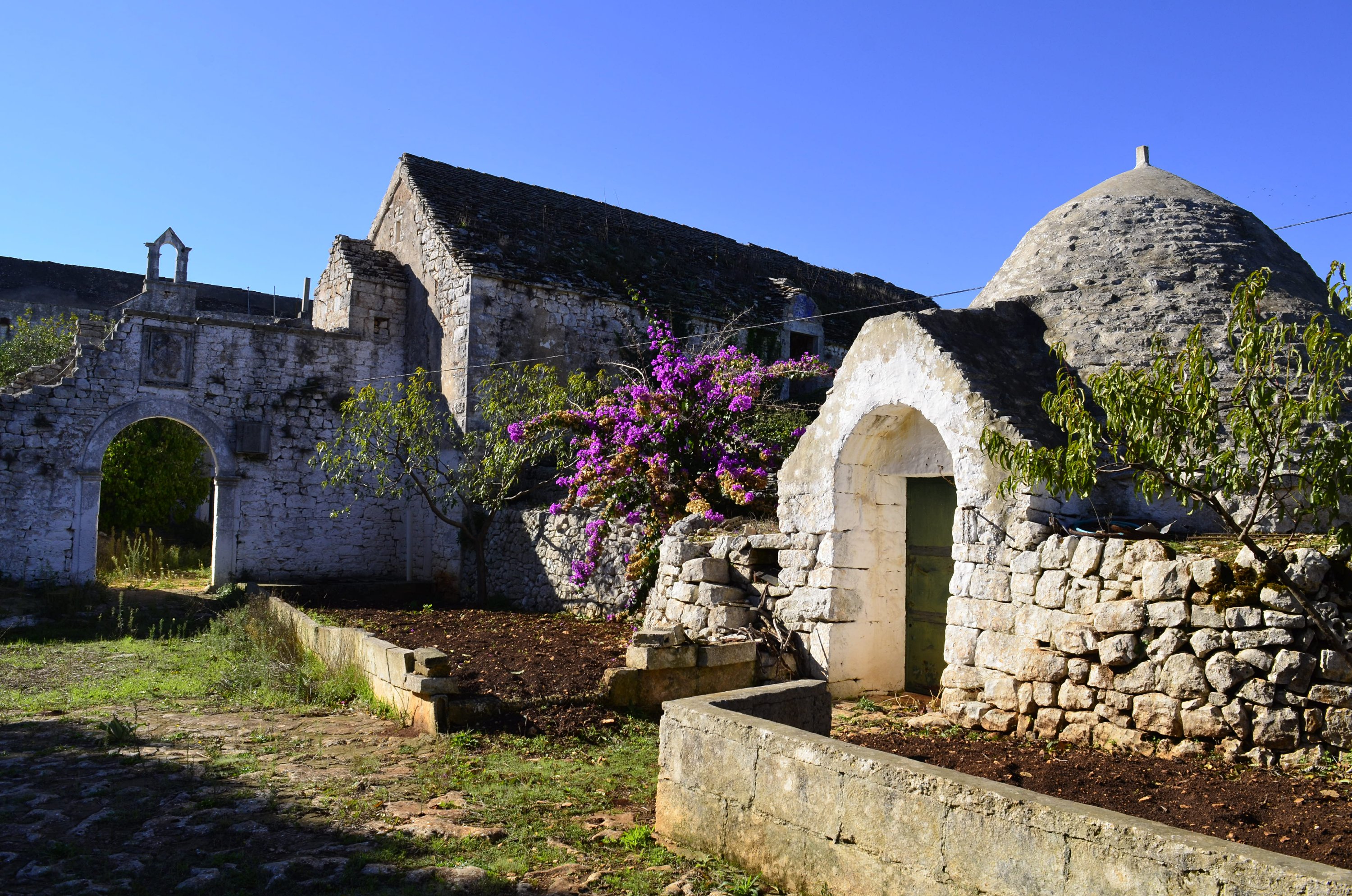 Farms, food and magical stone cottages in Italy's Puglia | AP News
