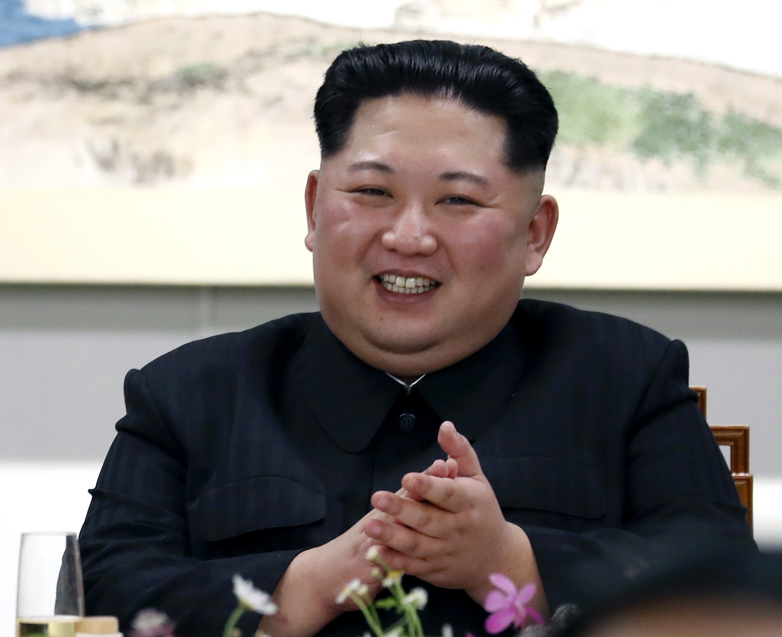 What Kim s Suit Shoes And Hairstyle Tell Us About Him AP News