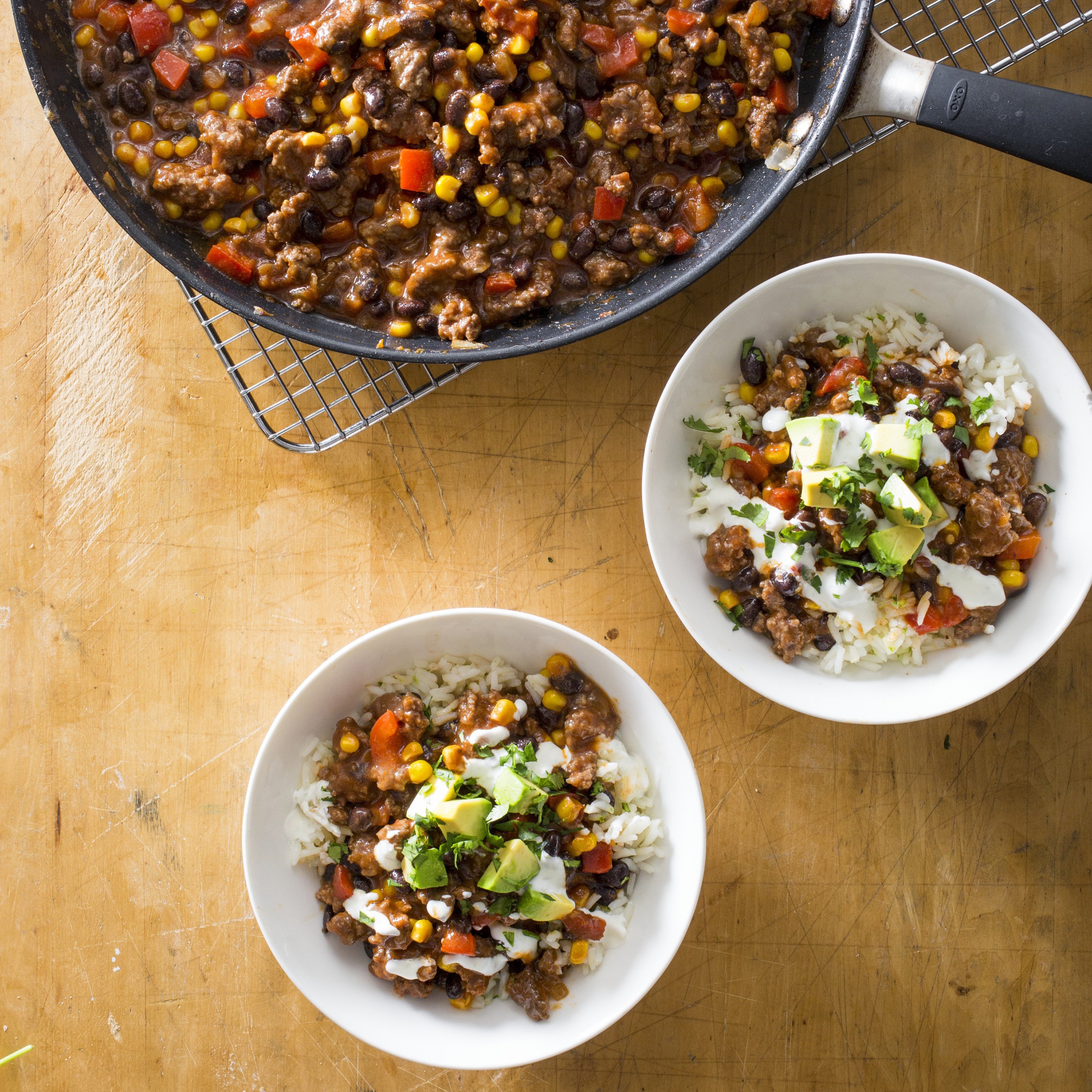 A one-pan chili with maximum flavor starts with toasted rice | AP News