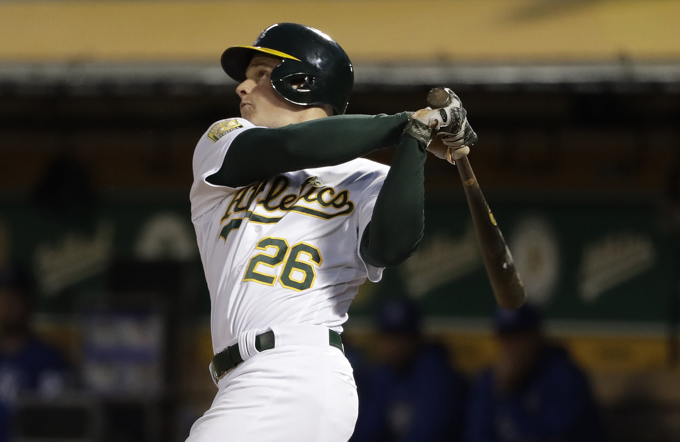 Chapman, A's break through in 6th to beat Royals 4-1 | AP News