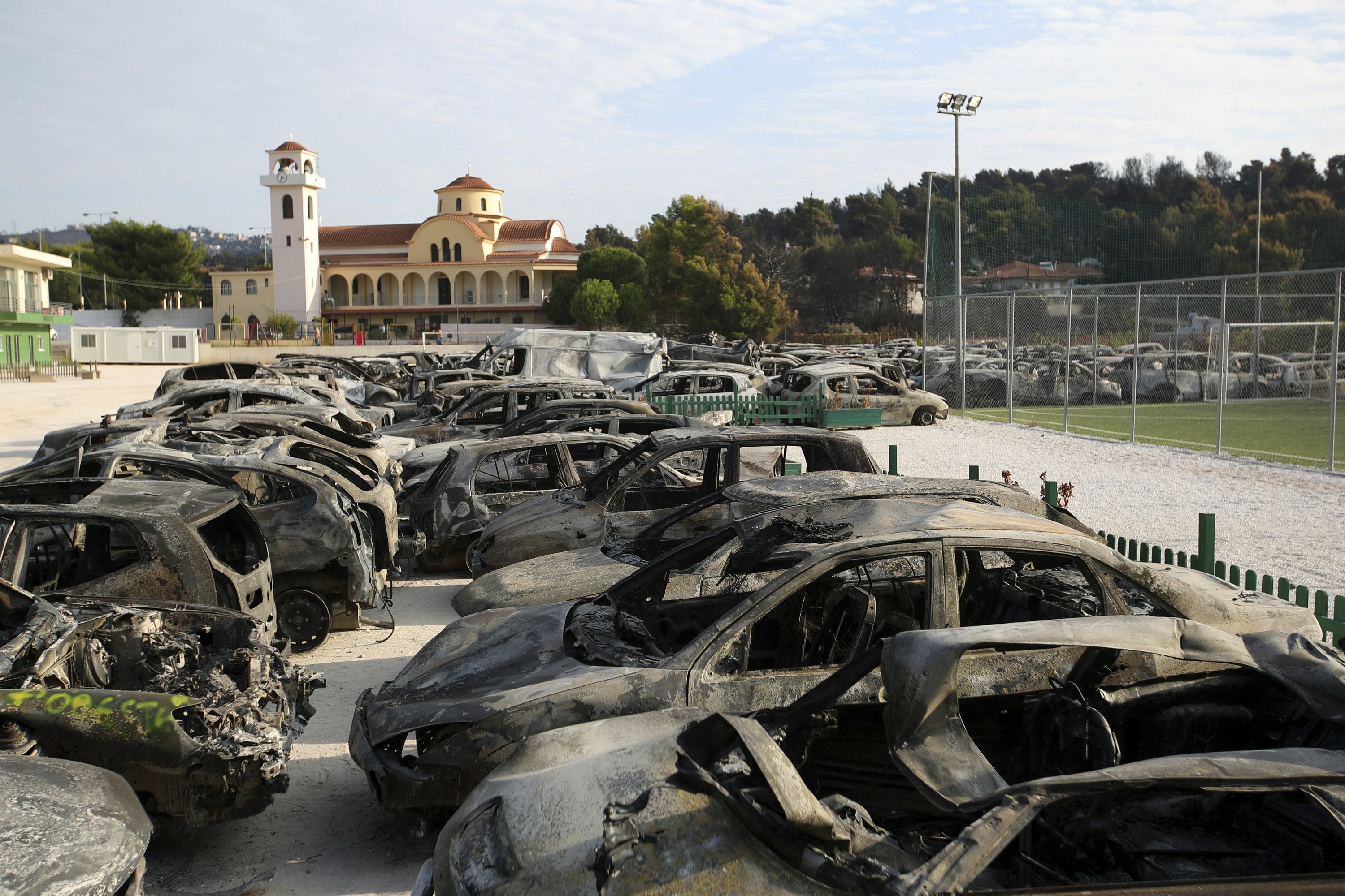 Arson linked to deaths in Greek town built like 'fire trap' | AP News