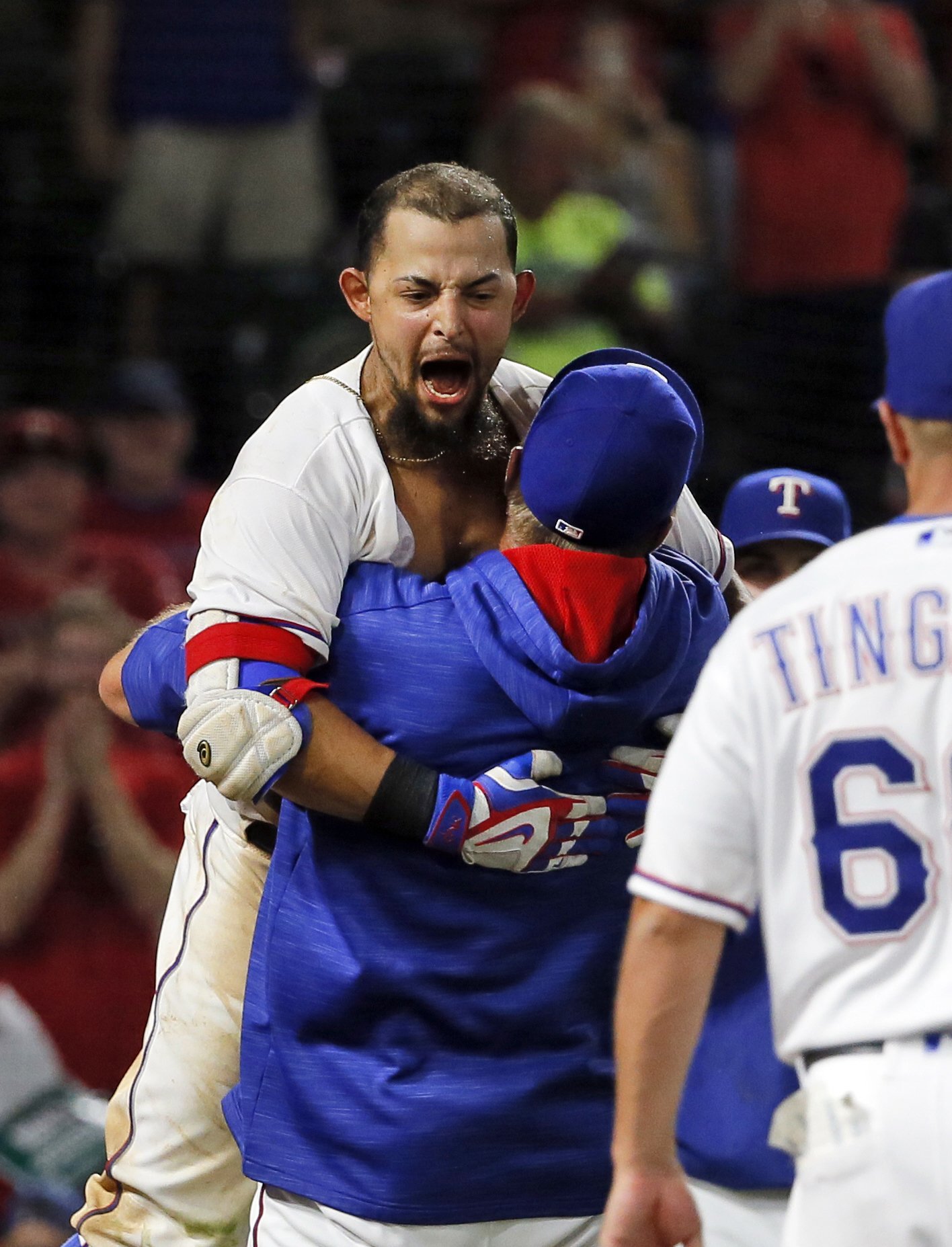 Odor hits game-ending homer for Rangers in 8-7 win over M's | AP News