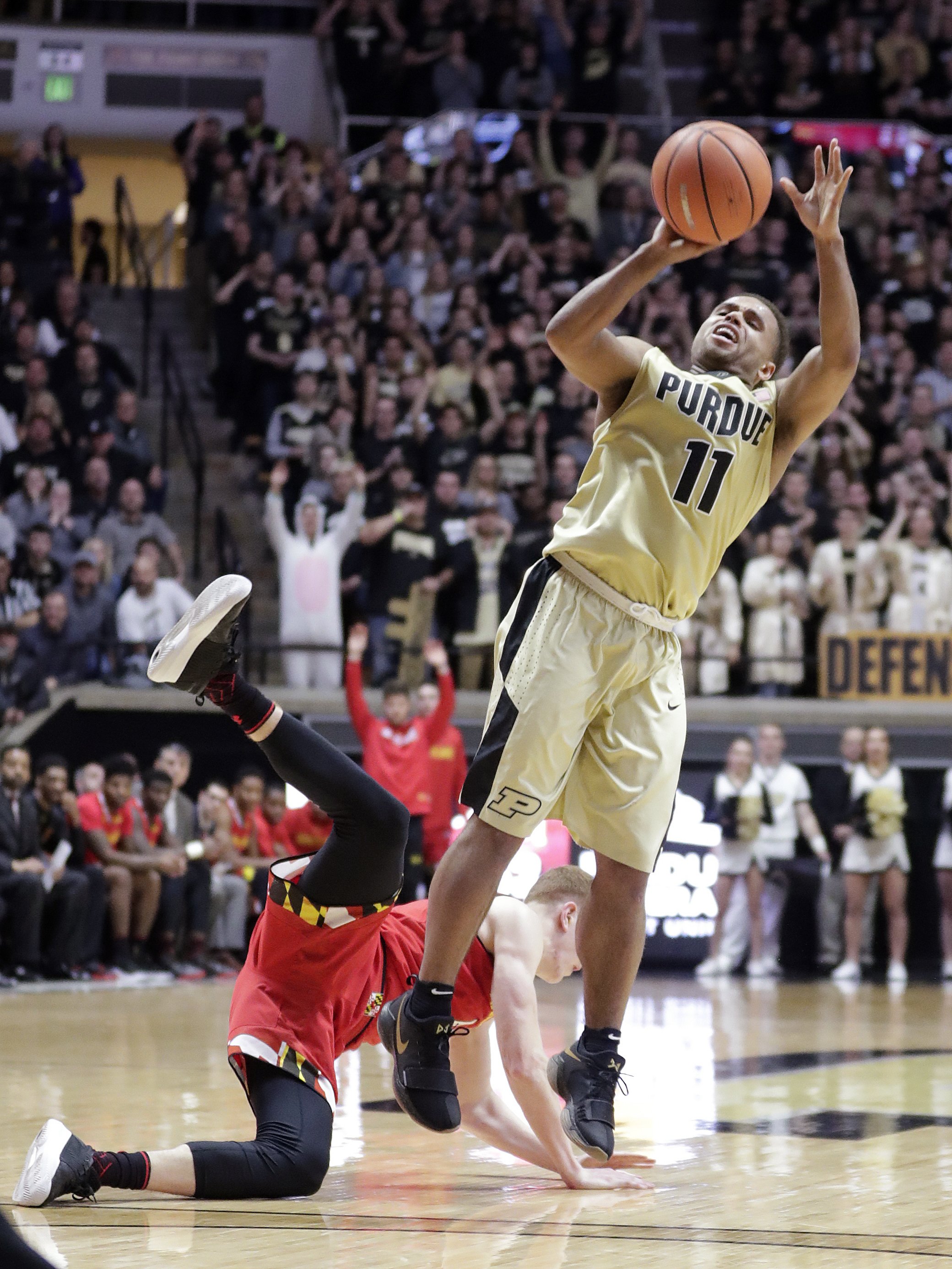 No. 3 Purdue gets past Maryland for 18th consecutive win | AP News