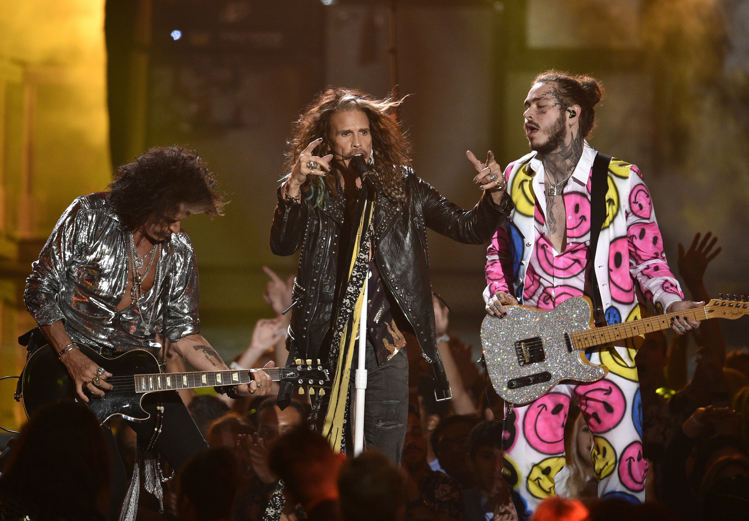 The Latest: Fans say they prayed for rapper on troubled jet | AP News