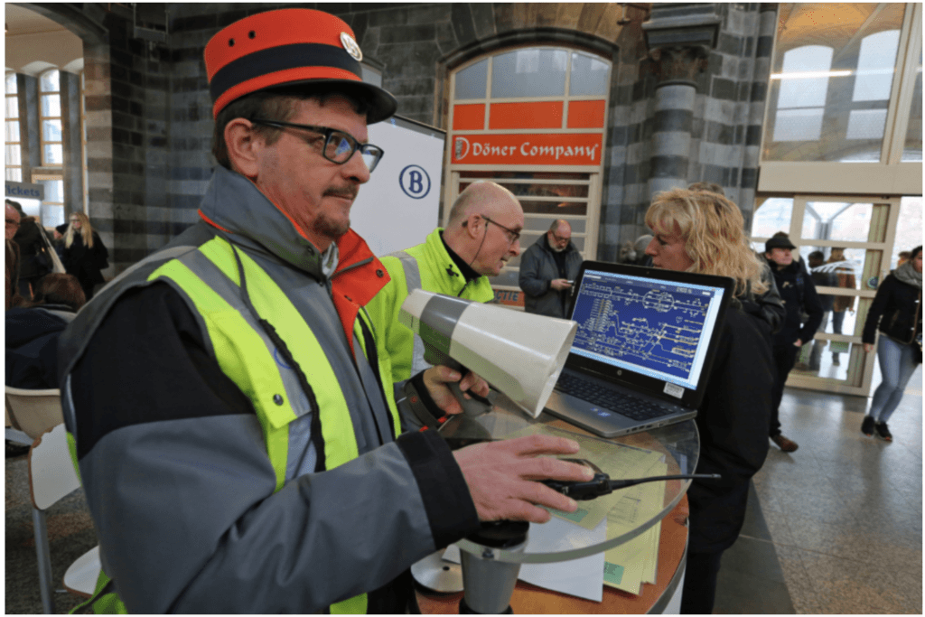 Train station staff to assist travellers from outside of booths