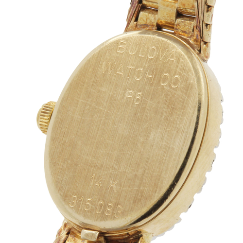 Bulova Ultime 14K Yellow Gold Diamond Bezel Ladies Watch | Outofpawn.com