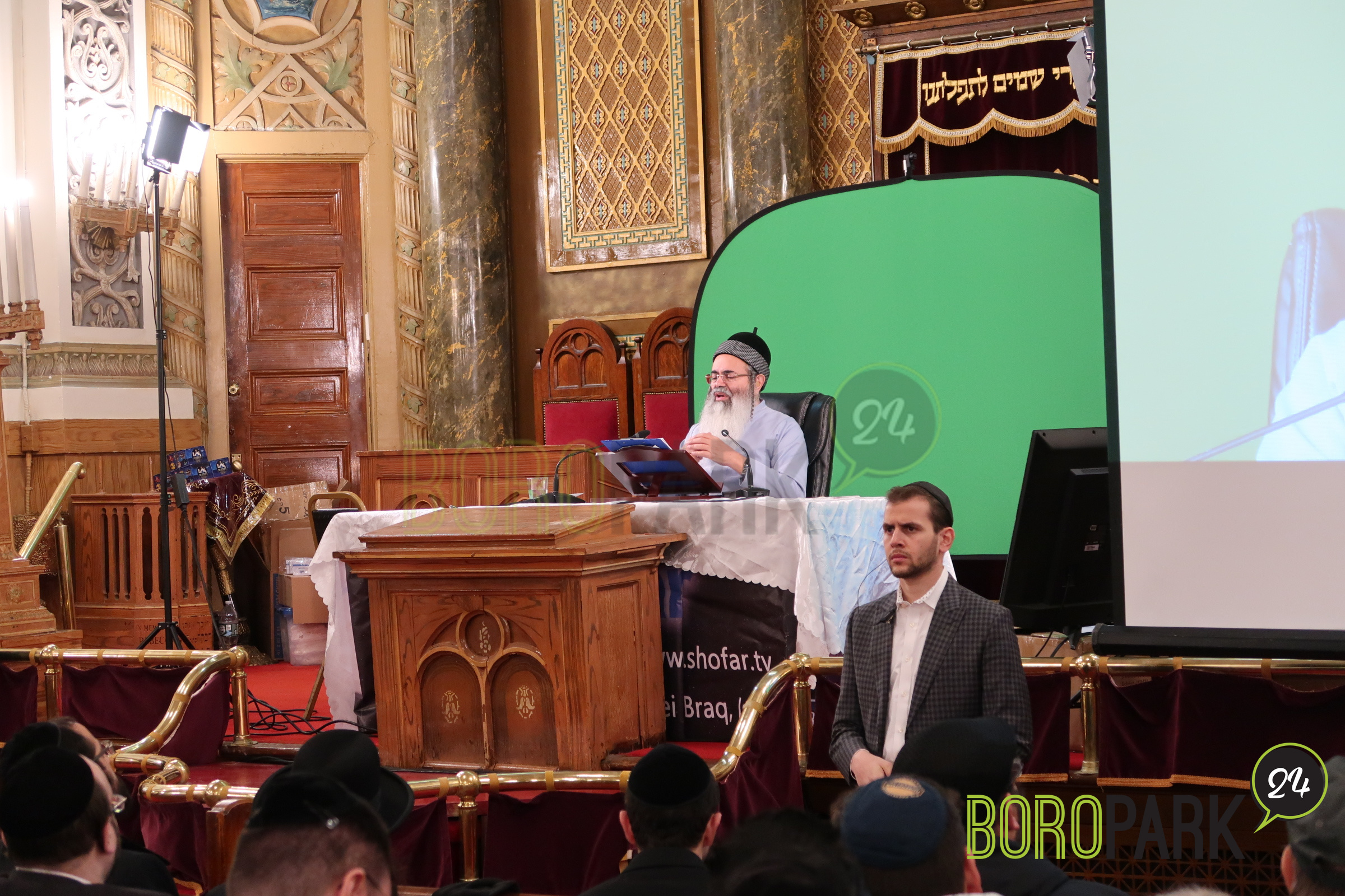 Photos: Rav Amnon Yitzchak speaking at the Young Israel Beth El Hall ...
