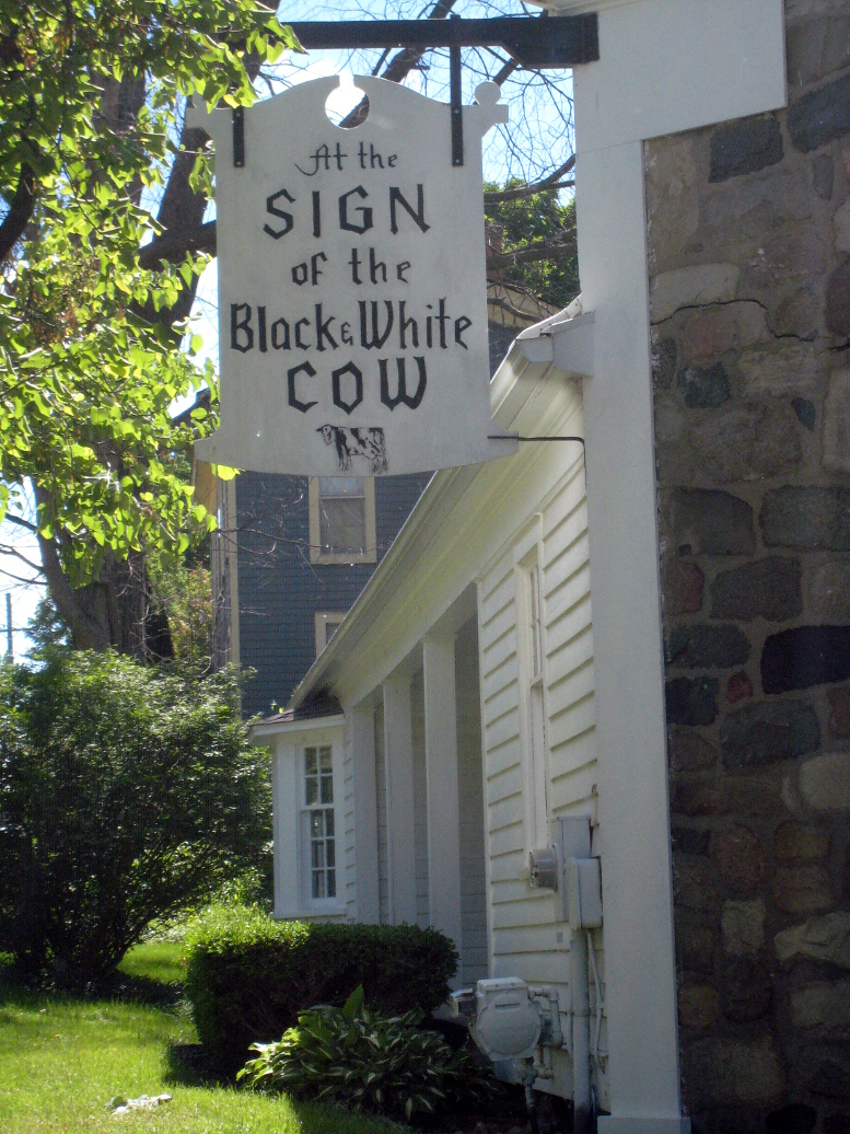 At the Sign of the Black & White Cow - Clio