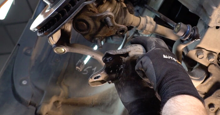 How to change front lower arm on Toyota RAV4 III – replacement guide ...