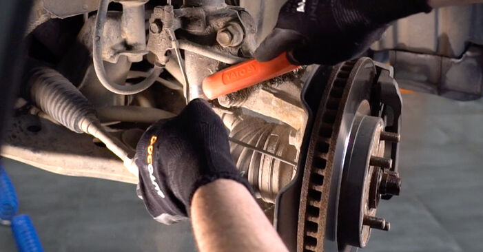 How to change front suspension strut on Toyota RAV4 III – replacement ...