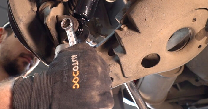 How to change rear shock absorbers on Toyota RAV4 III – replacement ...