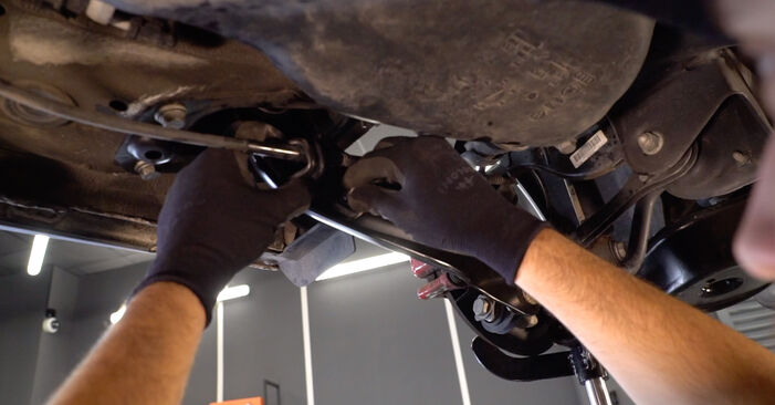 How to change rear suspension lower trailing arm on VW Beetle Hatchback ...