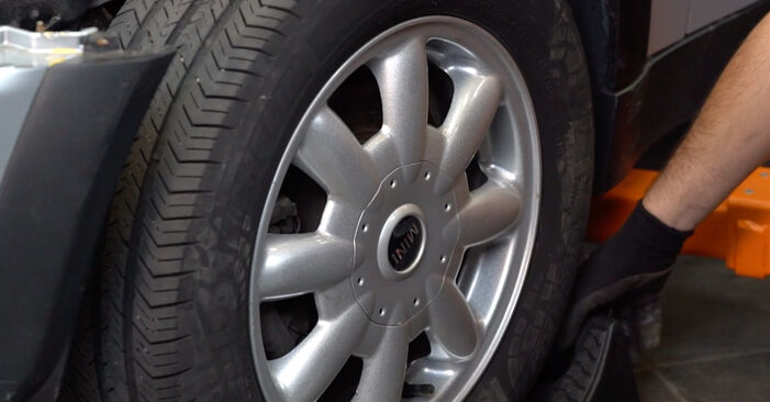 How to change front strut mount on MINI Convertible (R52) – replacement ...