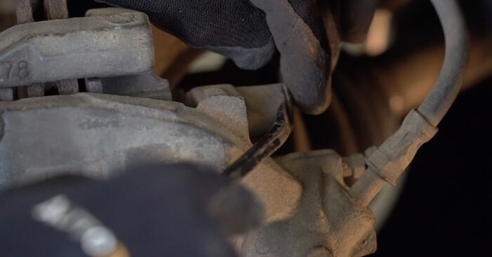 How to change front brake pads on FORD Kuga Mk1 Off-Road – replacement ...