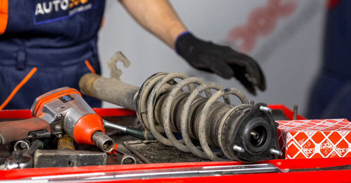 How to change front strut mount on FORD Fiesta Mk5 Van – replacement ...