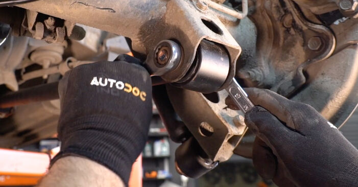 How to change rear suspension lower trailing arm on TOYOTA FJ Cruiser ...