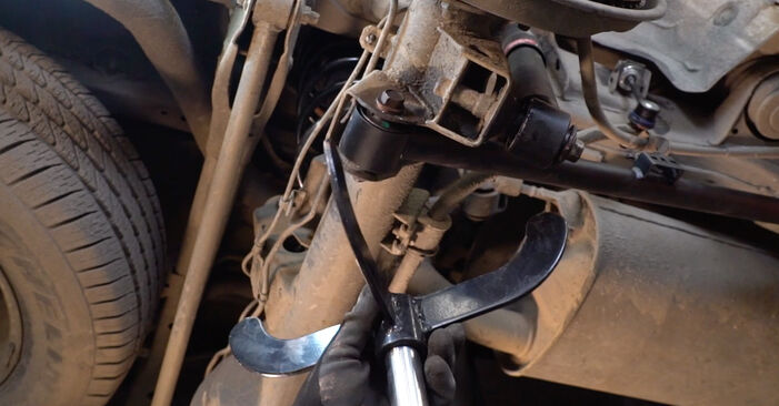 How to change rear suspension lower trailing arm on TOYOTA FJ Cruiser ...