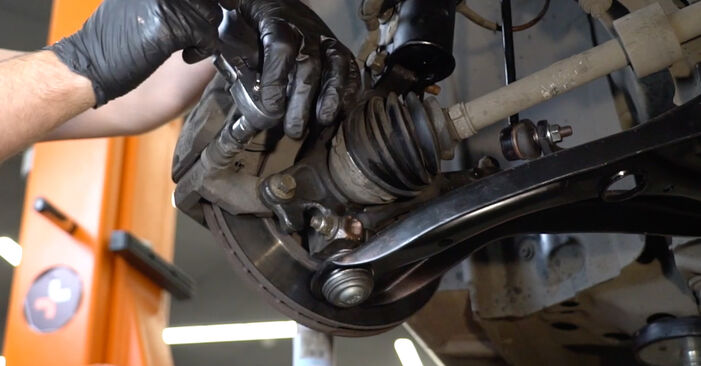 How to change front brake discs on FORD TRANSIT COURIER Box ...