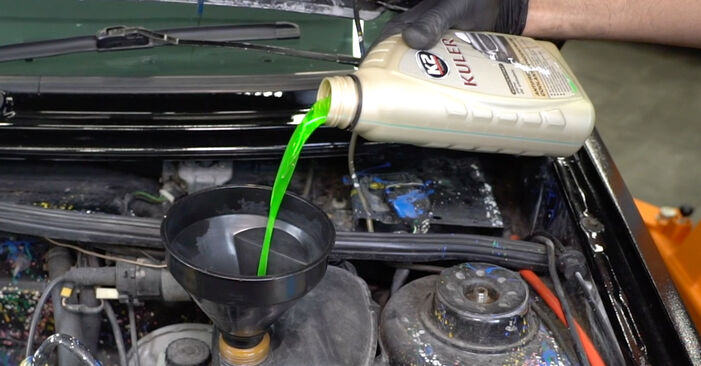 How to change engine thermostat on SKODA Felicia I Pickup (6UF, 6U7 ...