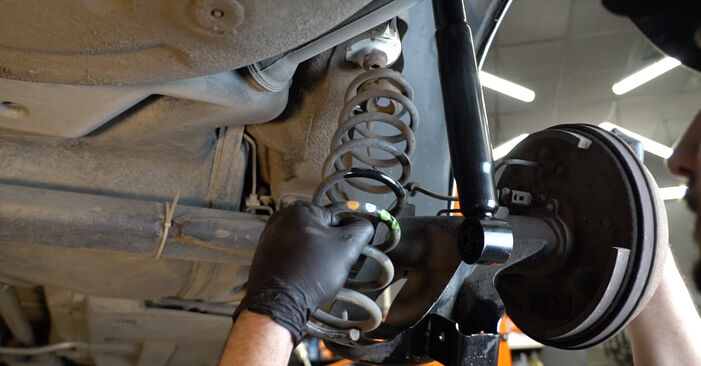 How to change rear coil springs on SKODA Rapid Hatchback (NH3 ...