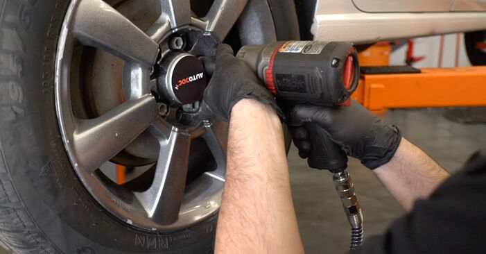 How to change rear coil springs on SKODA Rapid Hatchback (NH3 ...