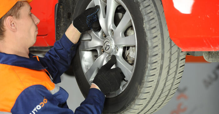 How to change front suspension strut on MAZDA 3 Saloon (BL ...