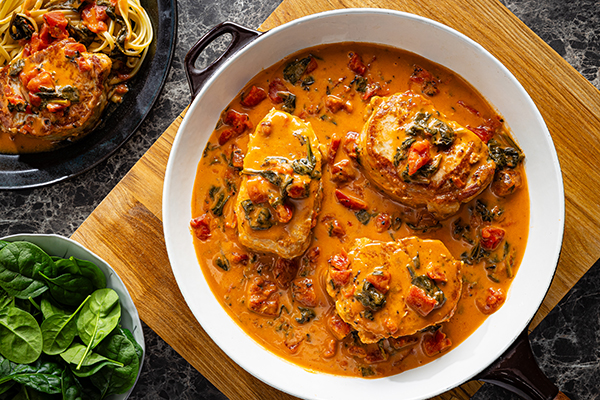 Creamy Tuscan Pork Chops Recipe | {{SiteName}} - Gourmet